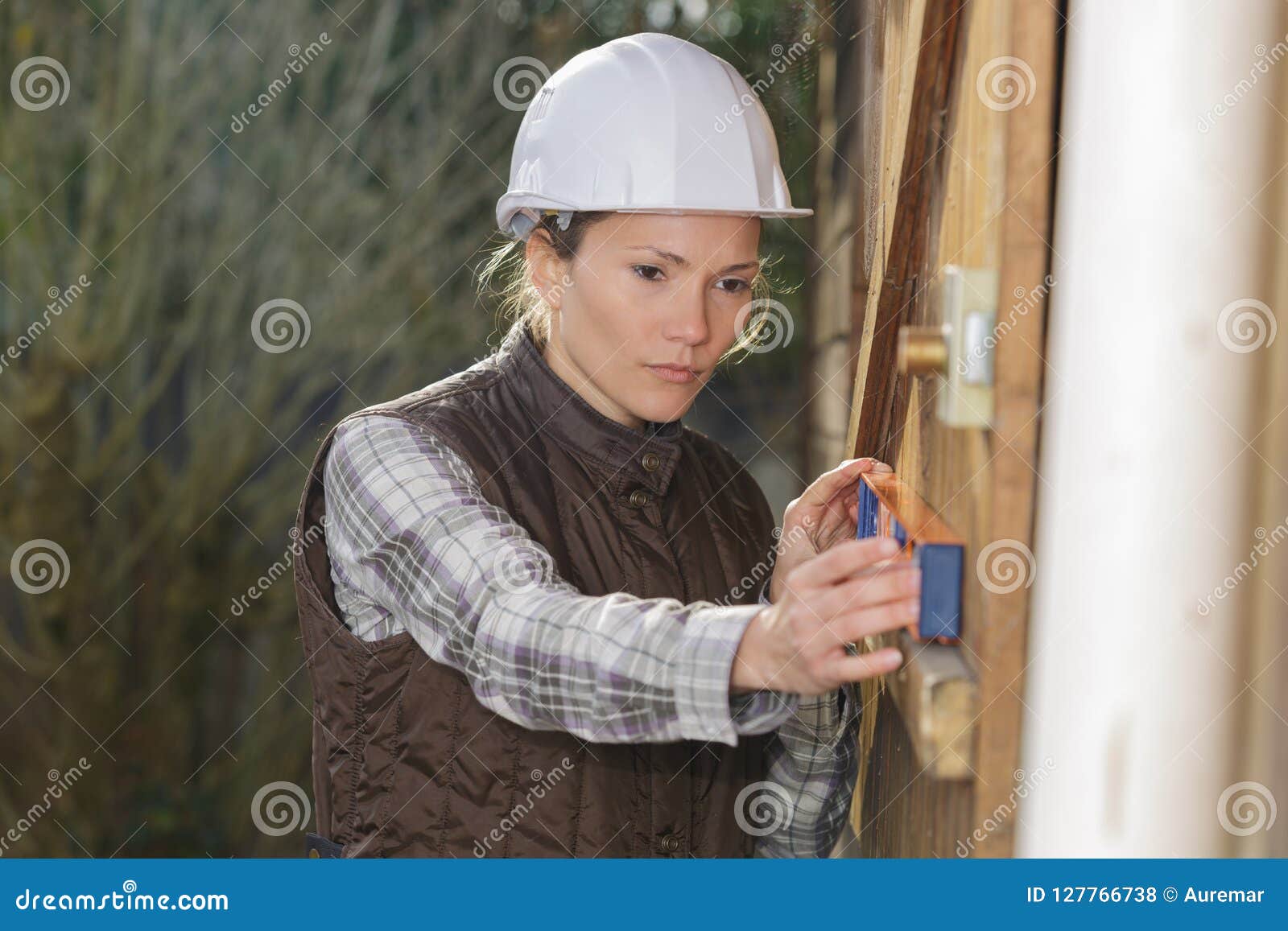 Female Wooden Shutter Installer Stock Photo - Image of hardhat, surface ...