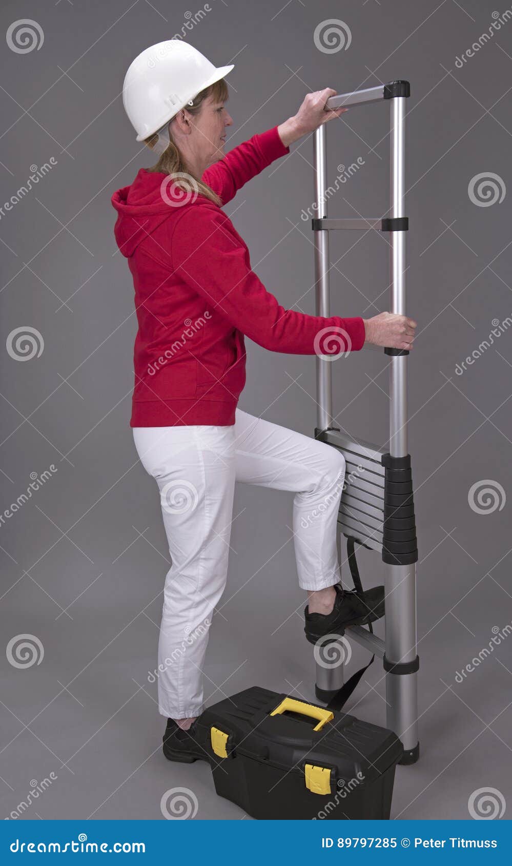 Female Worker Assembles a Telescopic Ladder Stock Image - Image of ...