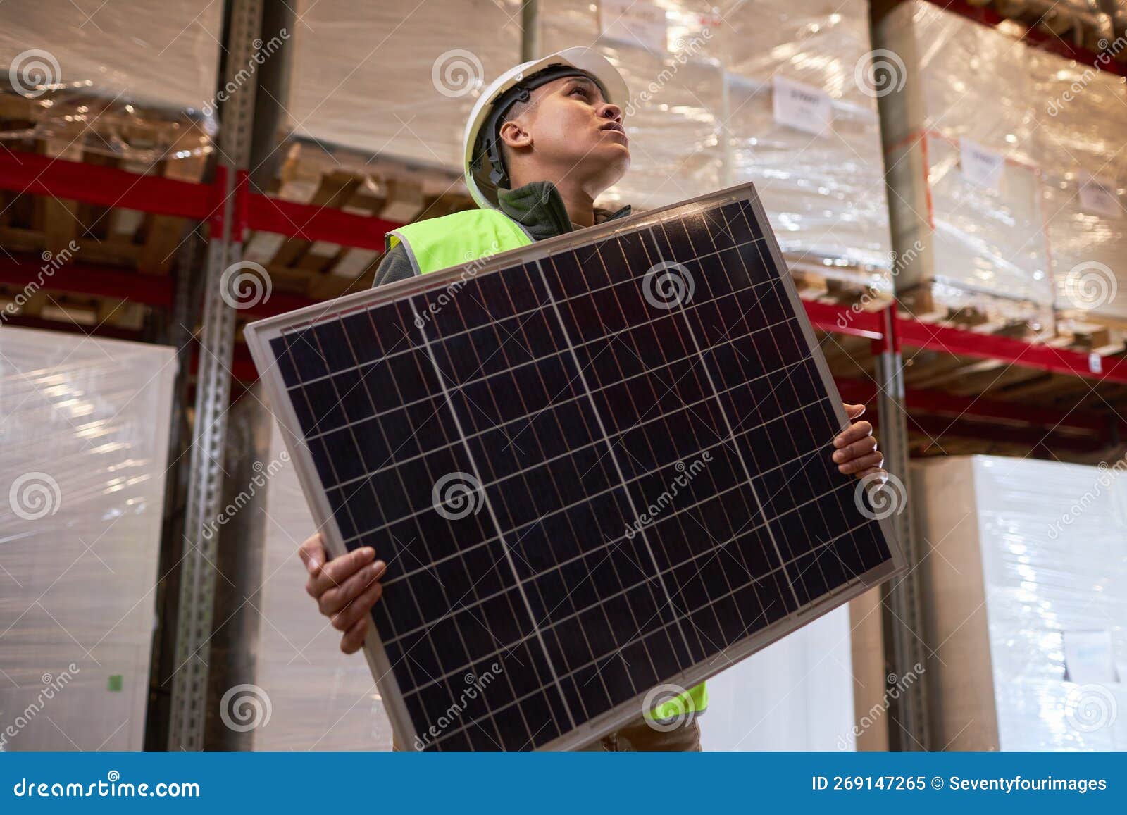 Female Worker Carrying Solar Panel at Indoor Warehouse Stock Image ...