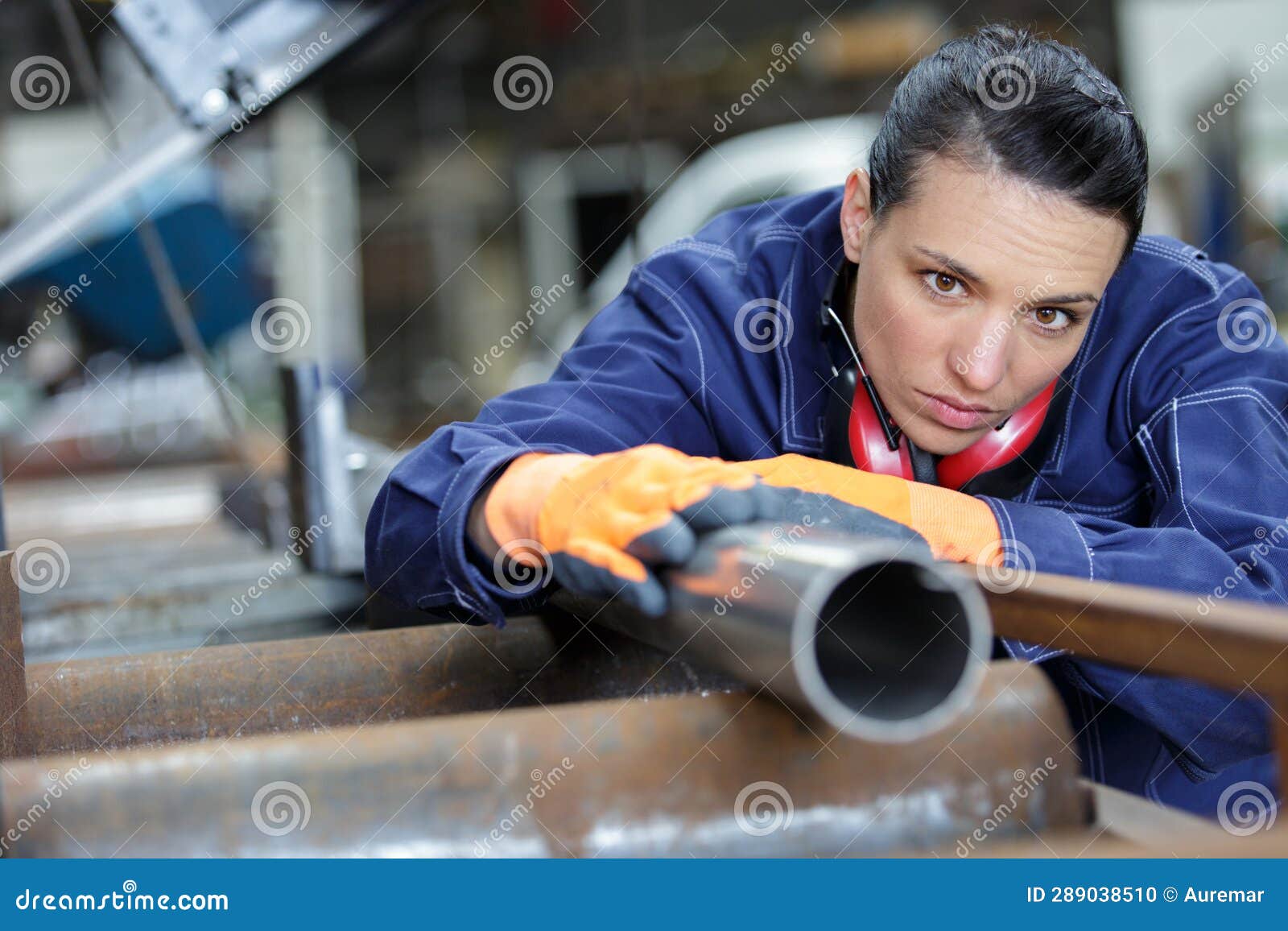 Female Worker Checking Pipe in Factory Stock Photo - Image of plant ...