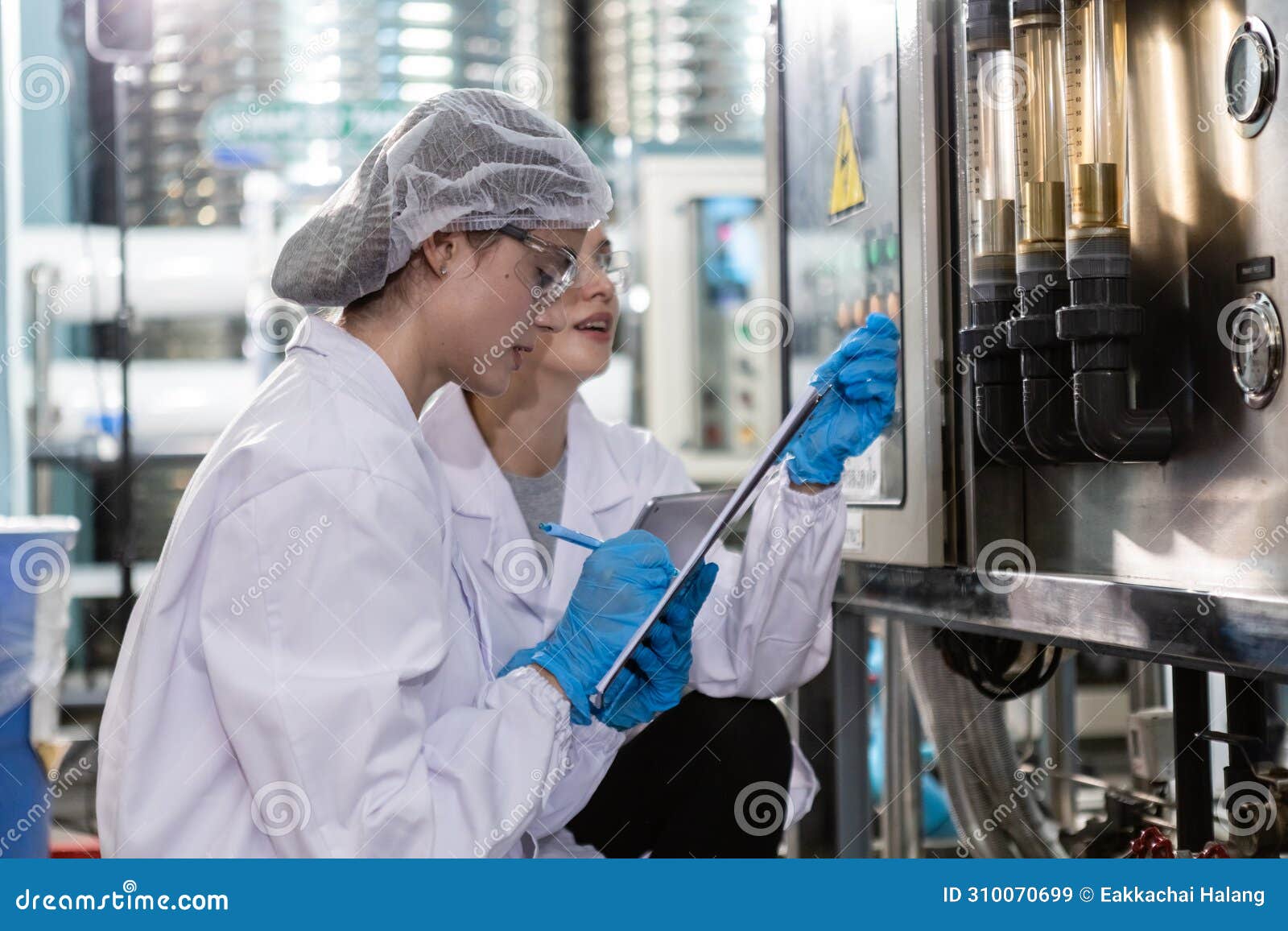 Female Worker Checking Quality Process of Filtering Cleanliness ...