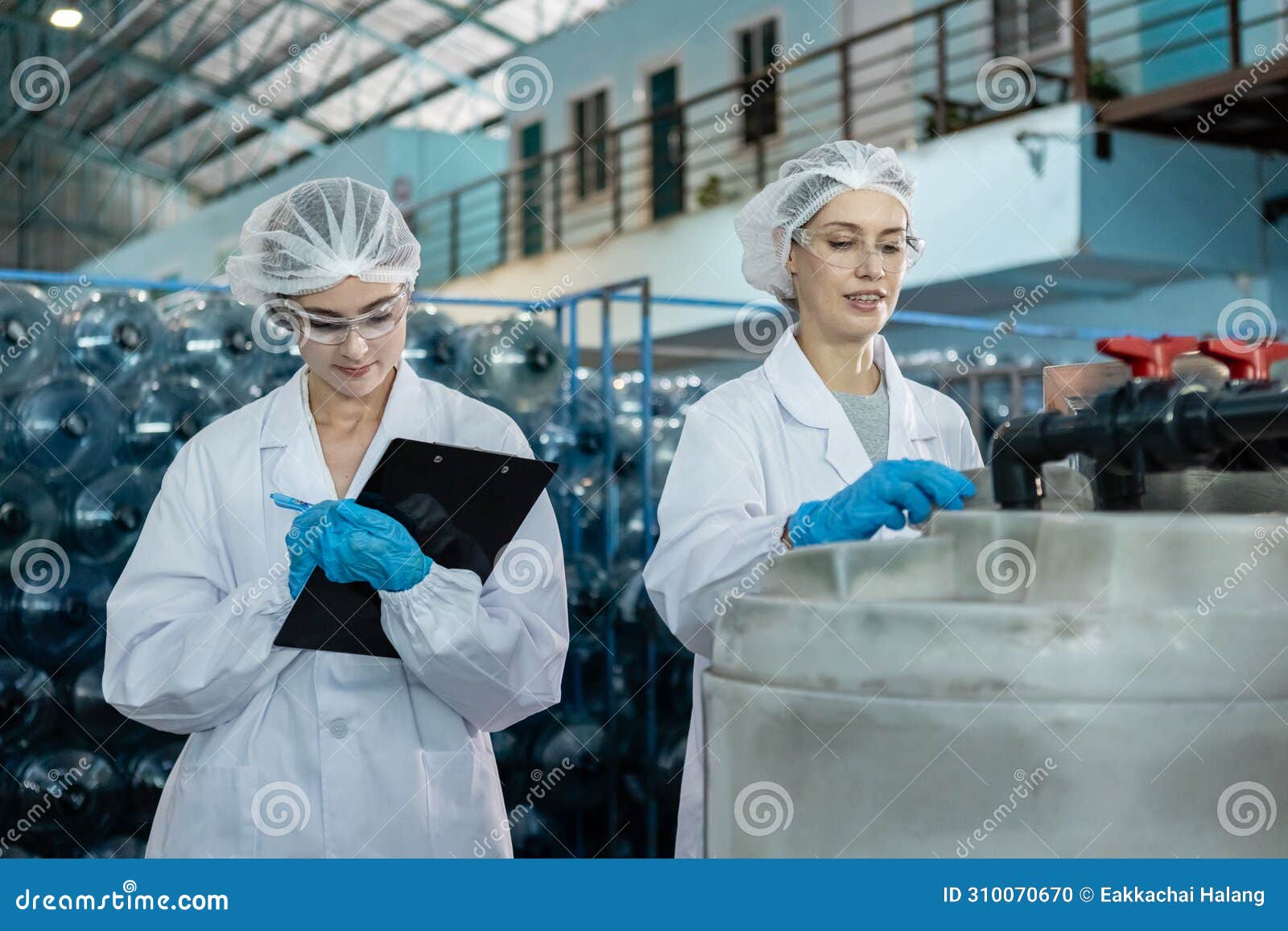 Female Worker Checking Quality Process of Filtering Cleanliness ...