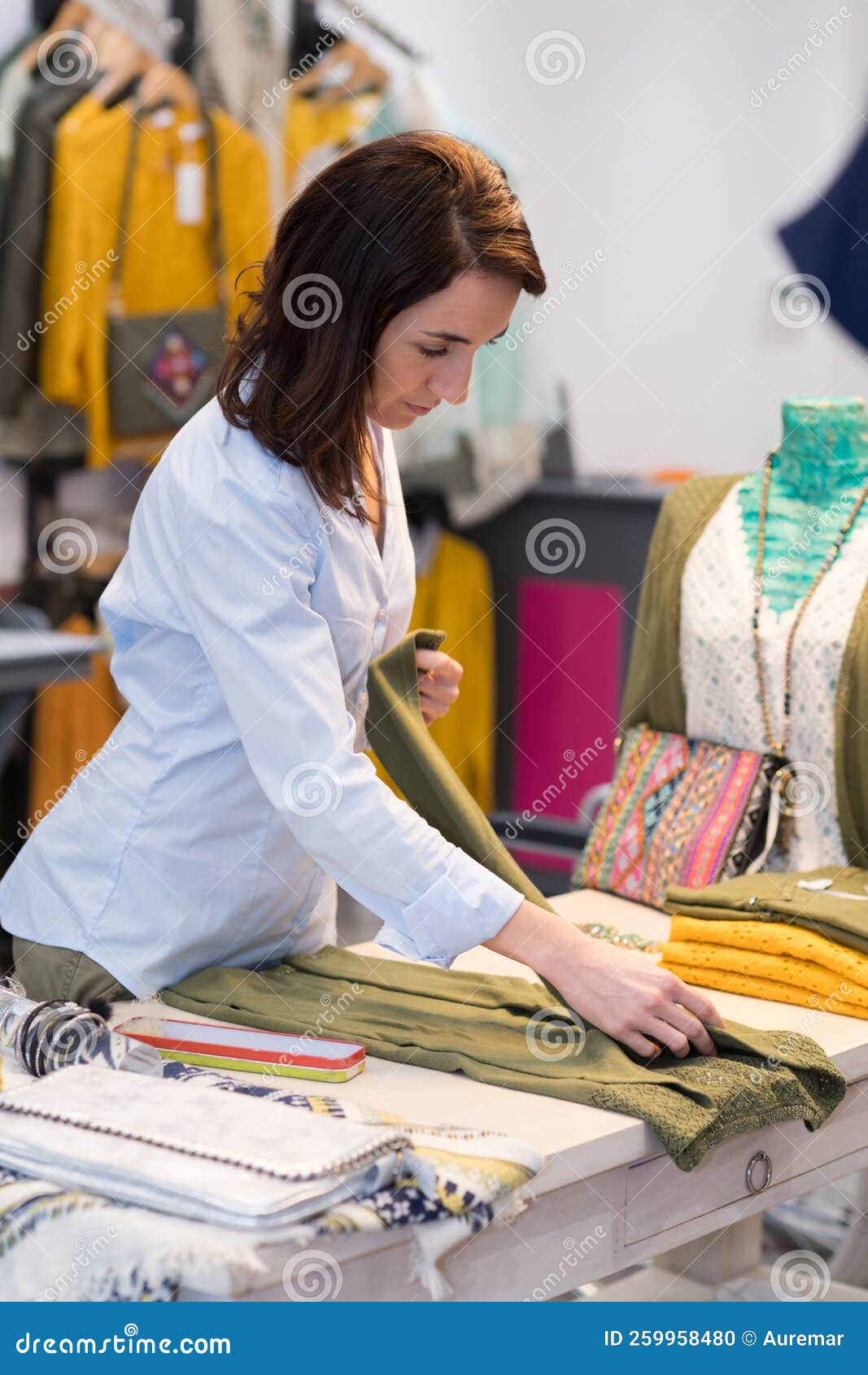 Female Worker in Clothing Store Stock Photo - Image of girl, woman ...