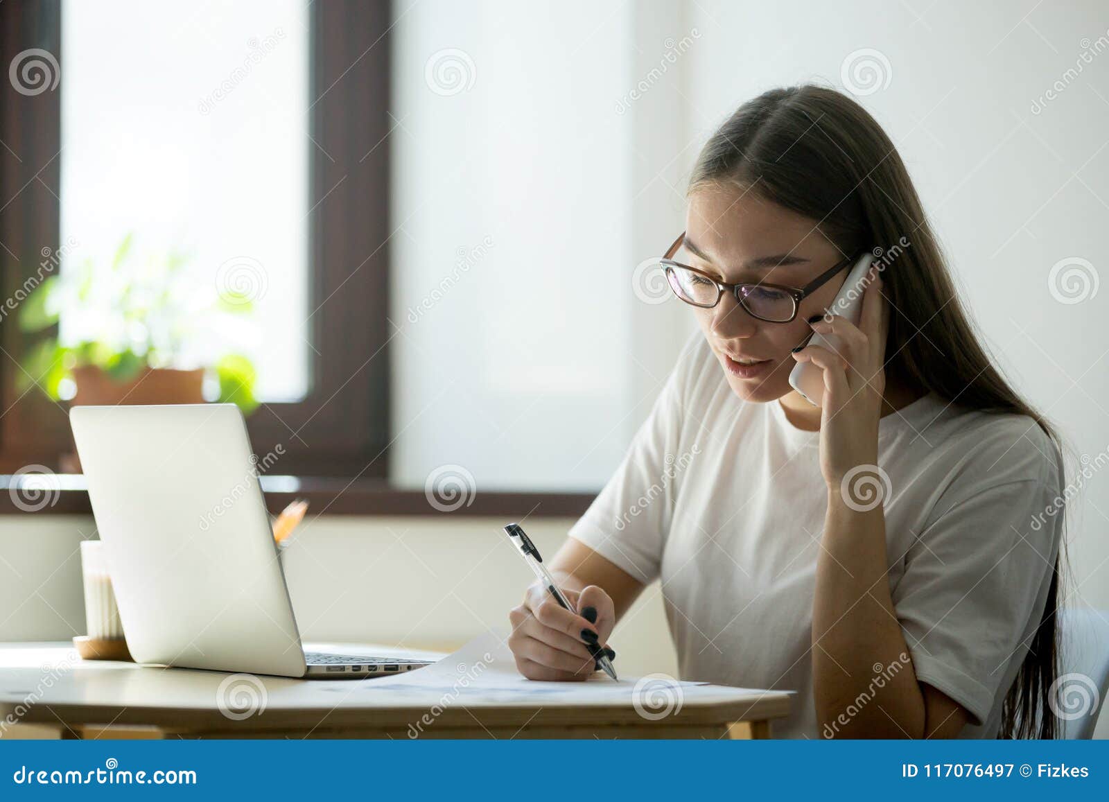 Female Worker Consulting Client Over Phone Stock Image - Image of ...