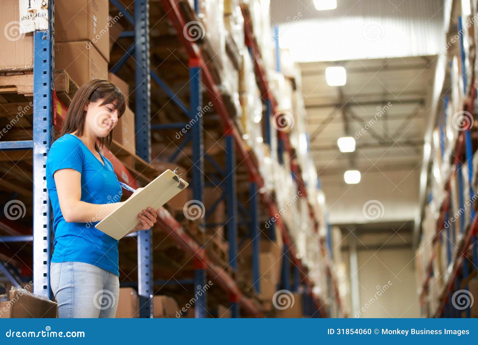 Female Worker in Distribution Warehouse Stock Photo - Image of ...