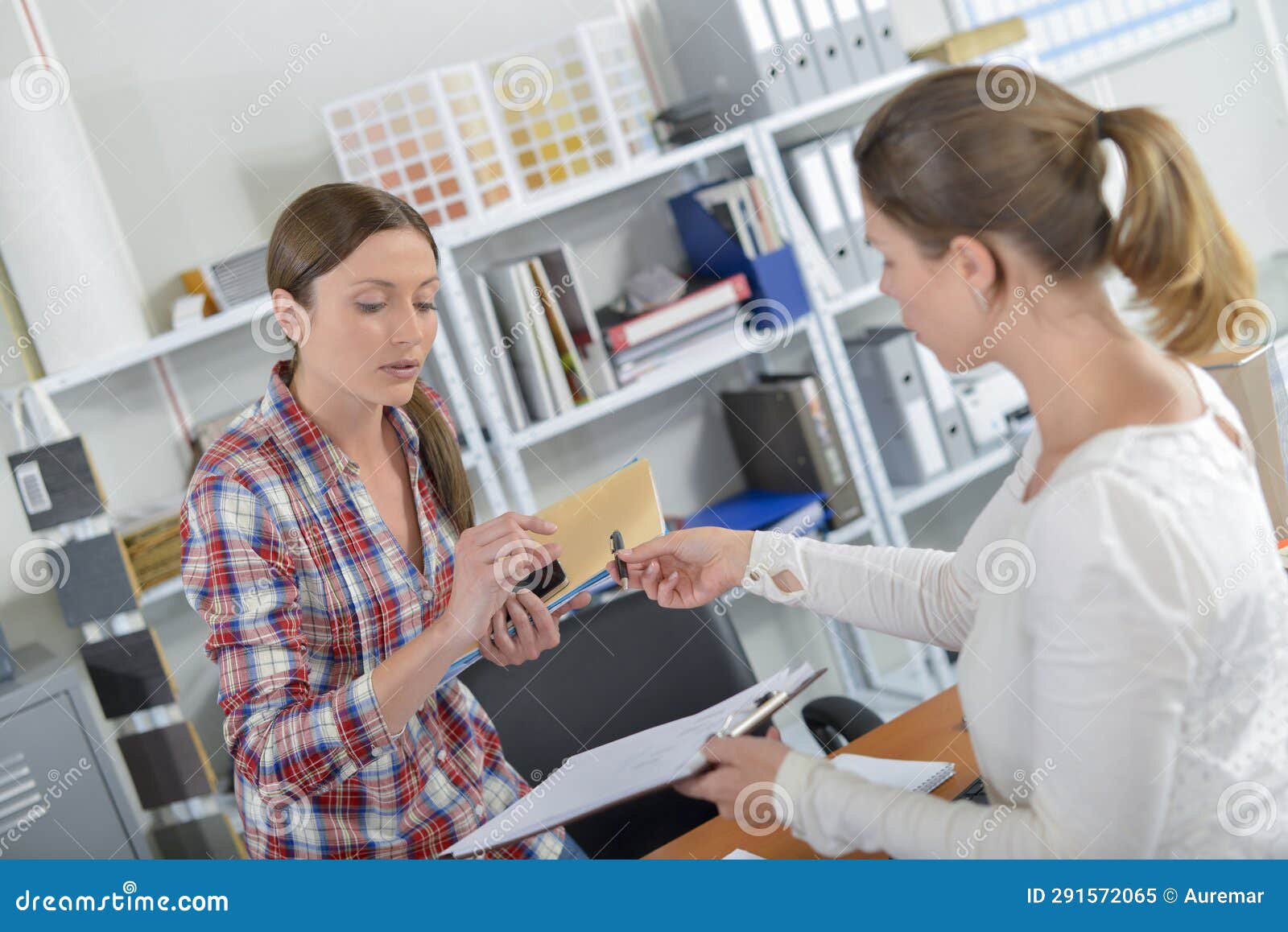 Female Worker Handing Over Document Stock Image - Image of strategy ...
