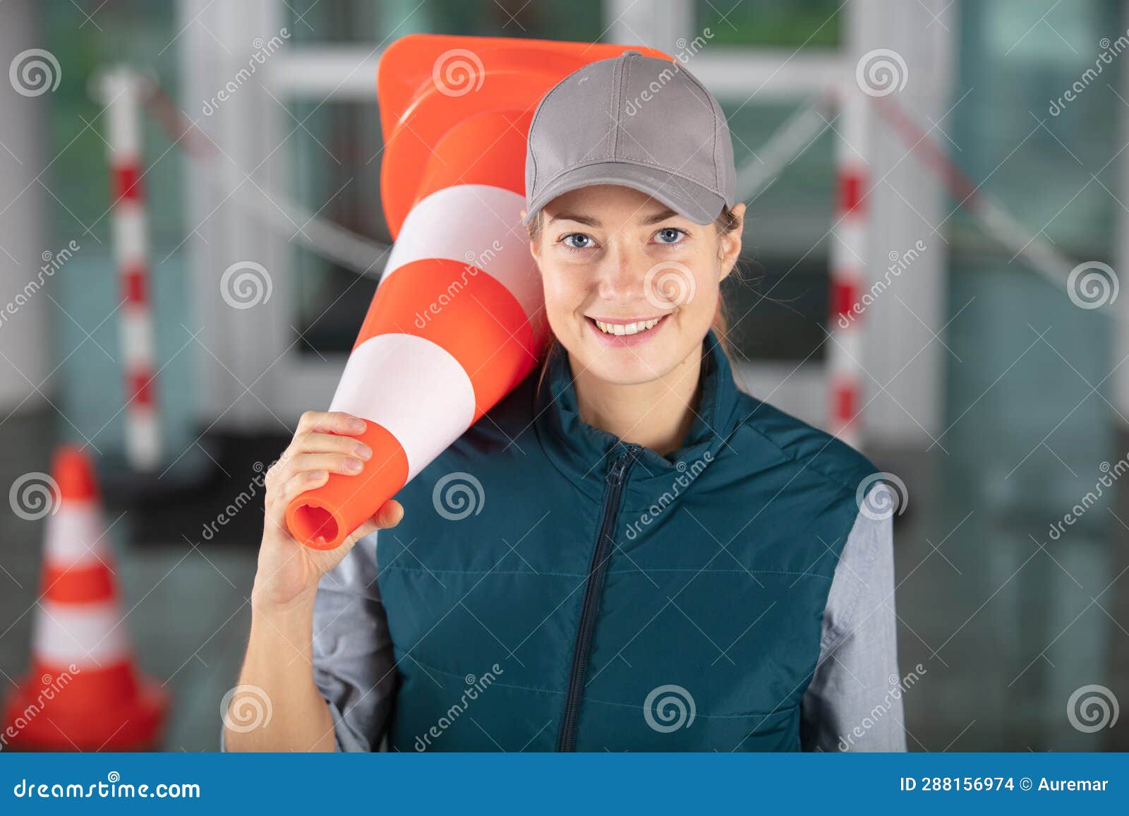 Female Worker Holding Construction Cone Stock Photo - Image of ...