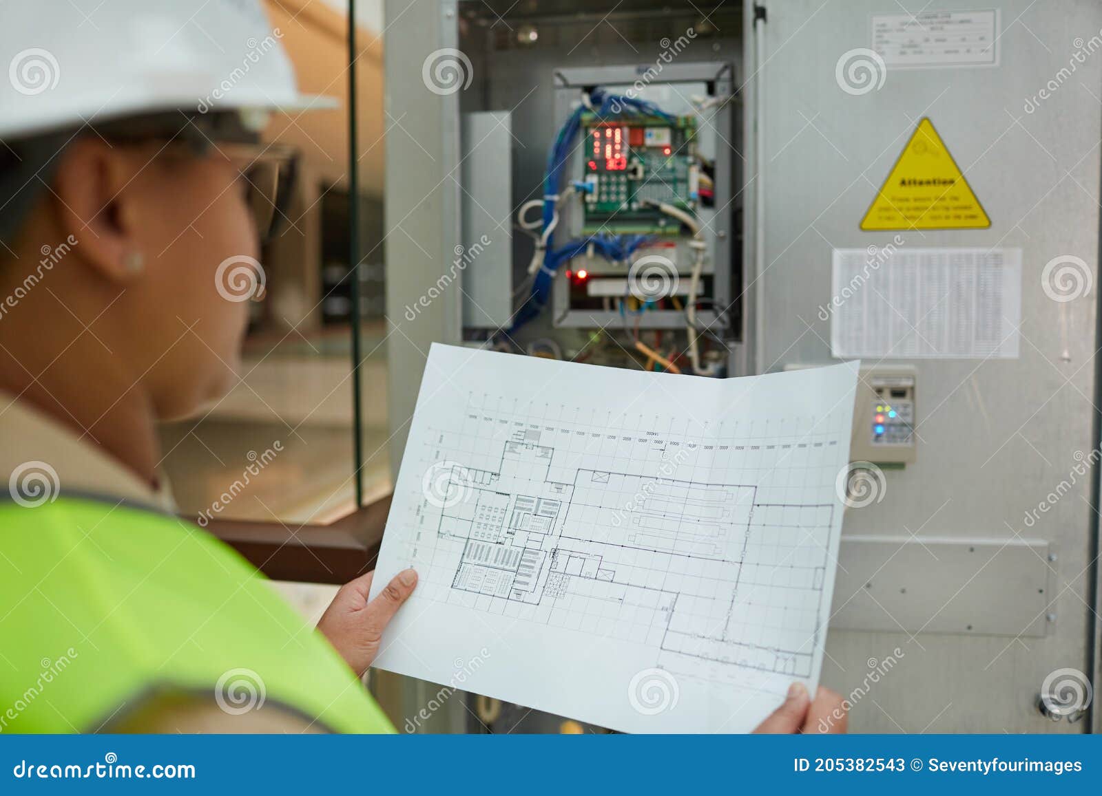 Female Worker Inspecting Electric Systems Stock Image - Image of ...