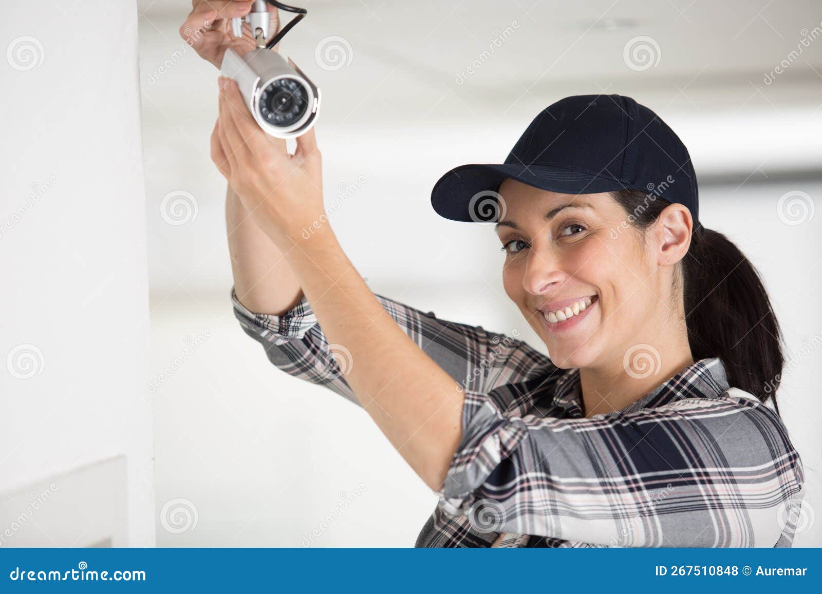 Female Worker Installing Cctv Camera Stock Photo - Image of contractor ...