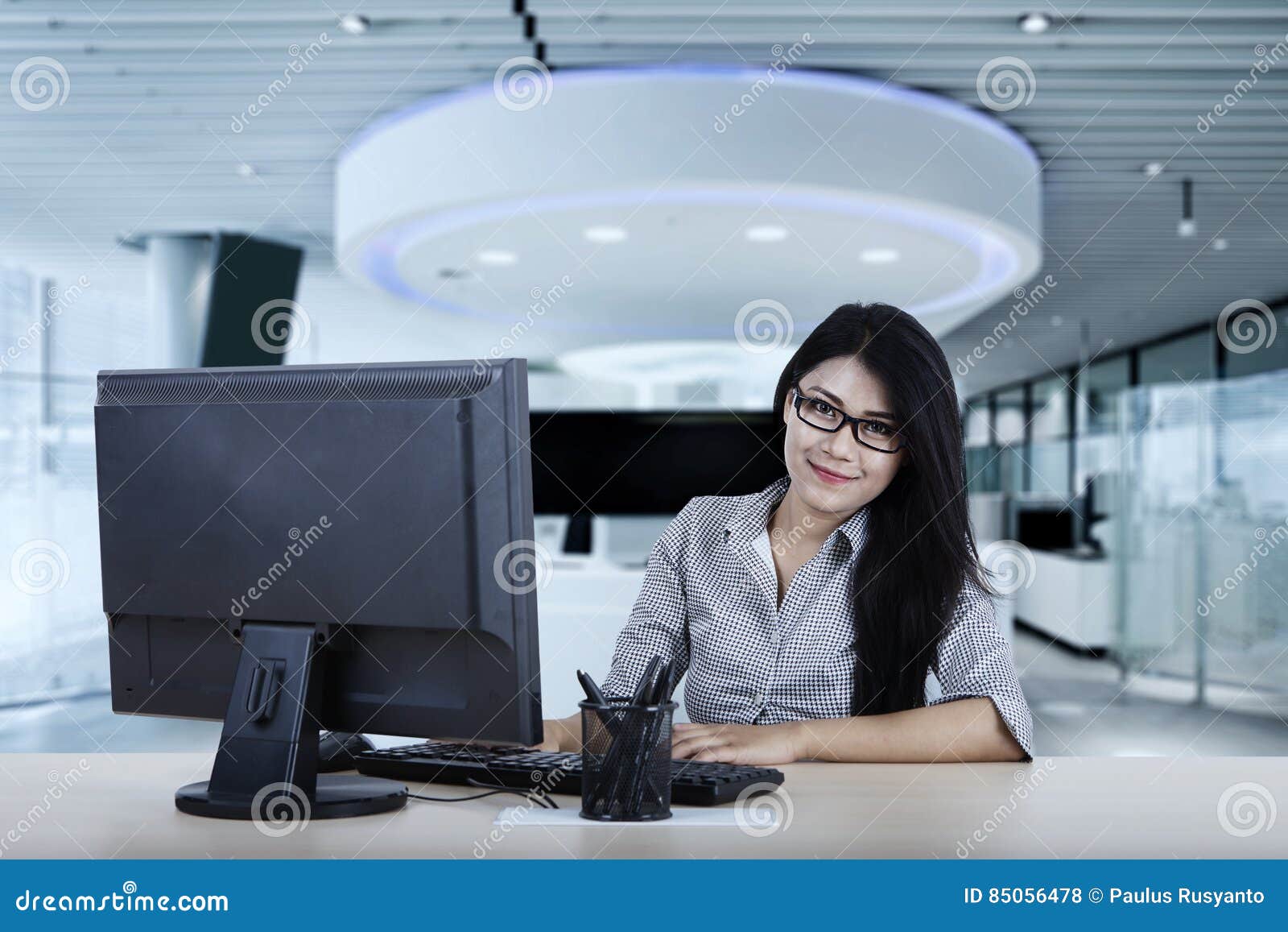Female Worker Looks Confident with Computer Stock Photo - Image of ...