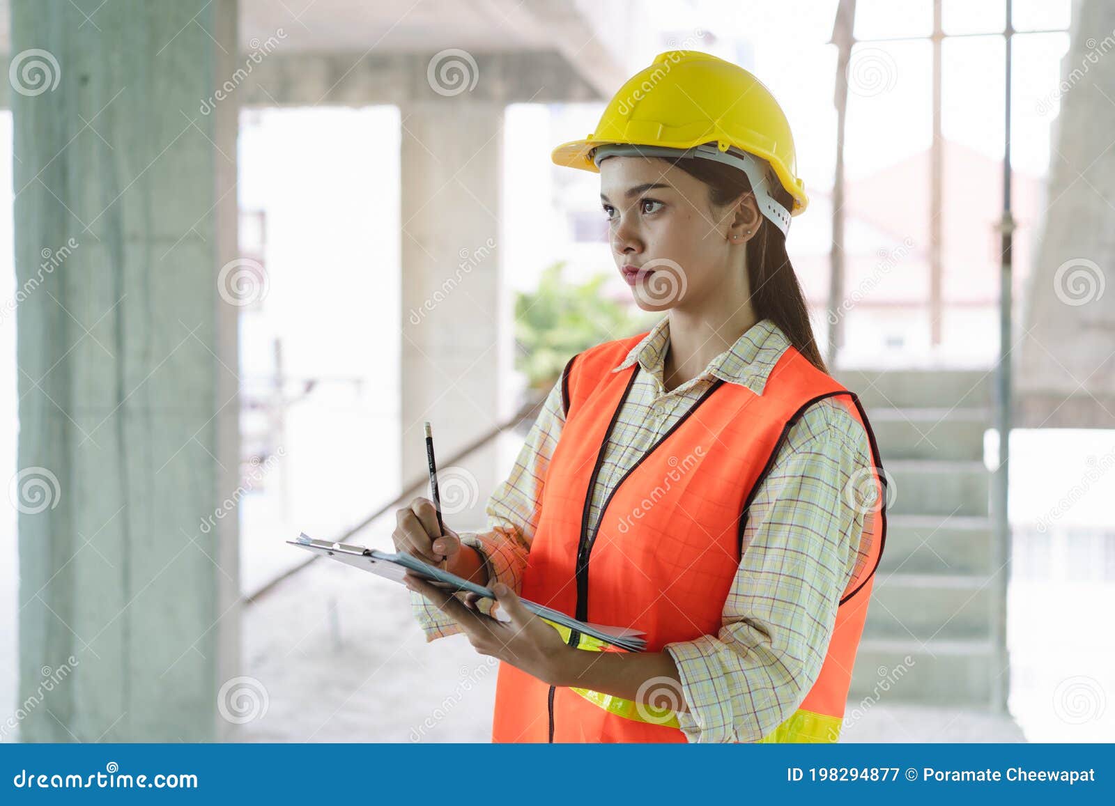 Female Worker Occupation. Woman Inspector / Architect Checking Interior ...