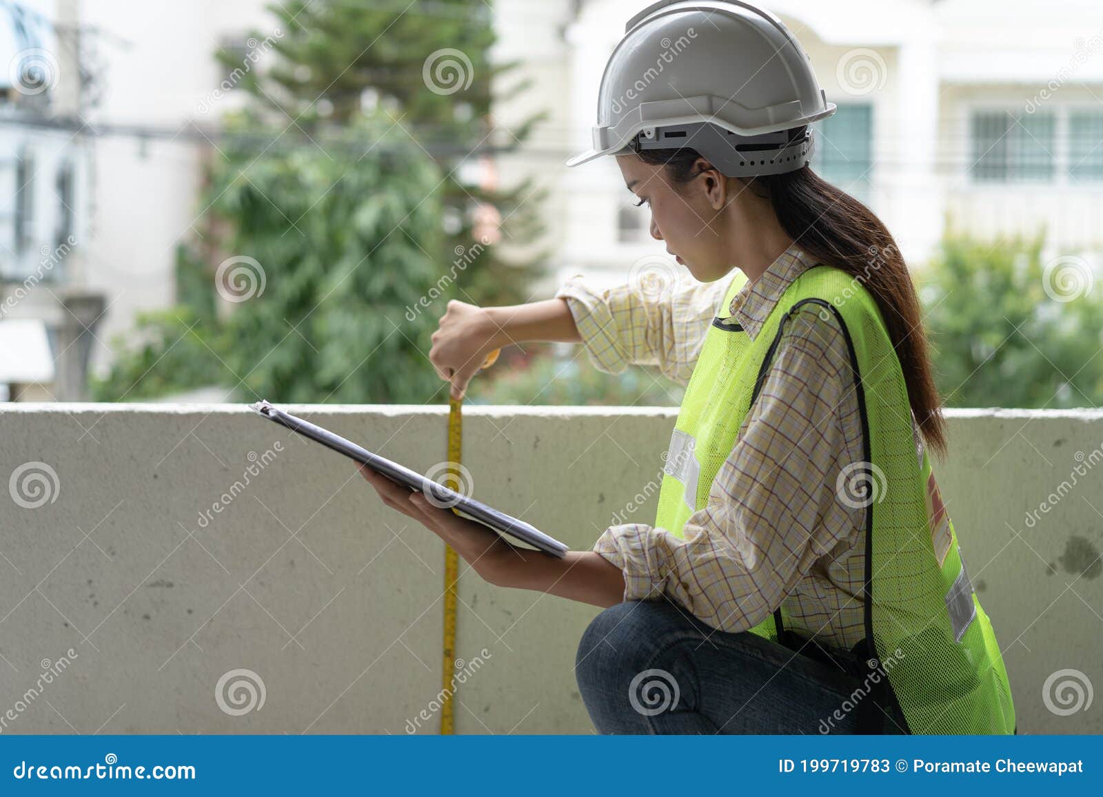 Female Worker. Woman Inspector / Architect Checking Interior Material ...