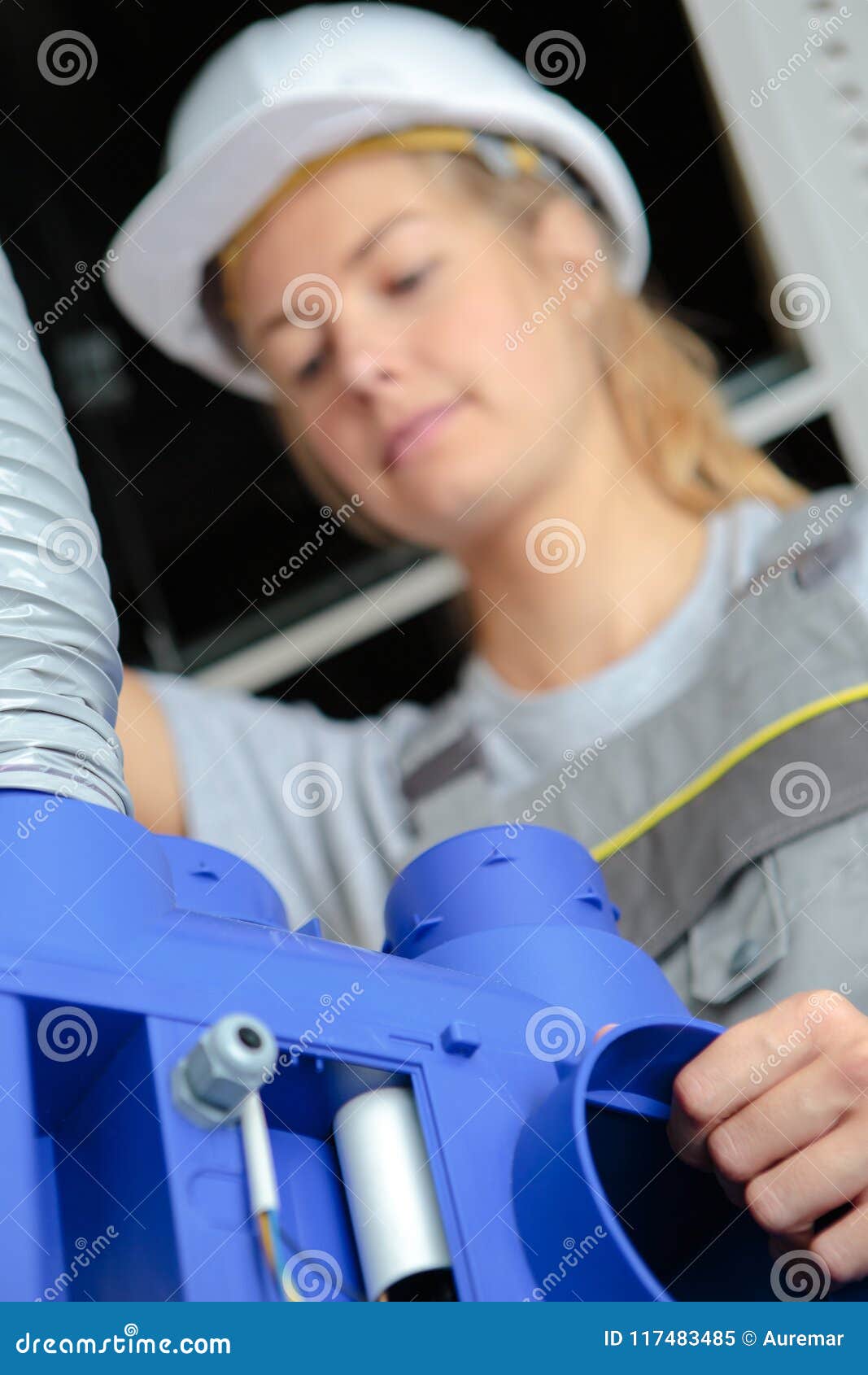 Female Worker Operating Machine in Factory Stock Image - Image of ...