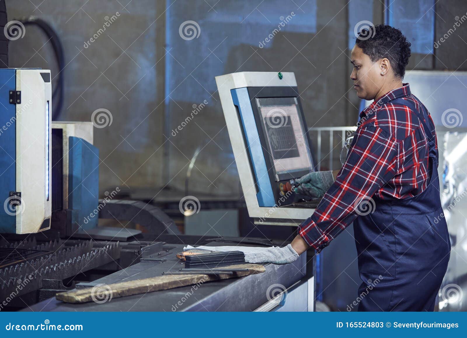 Female Worker Operating Machines in Workshop Stock Image - Image of ...