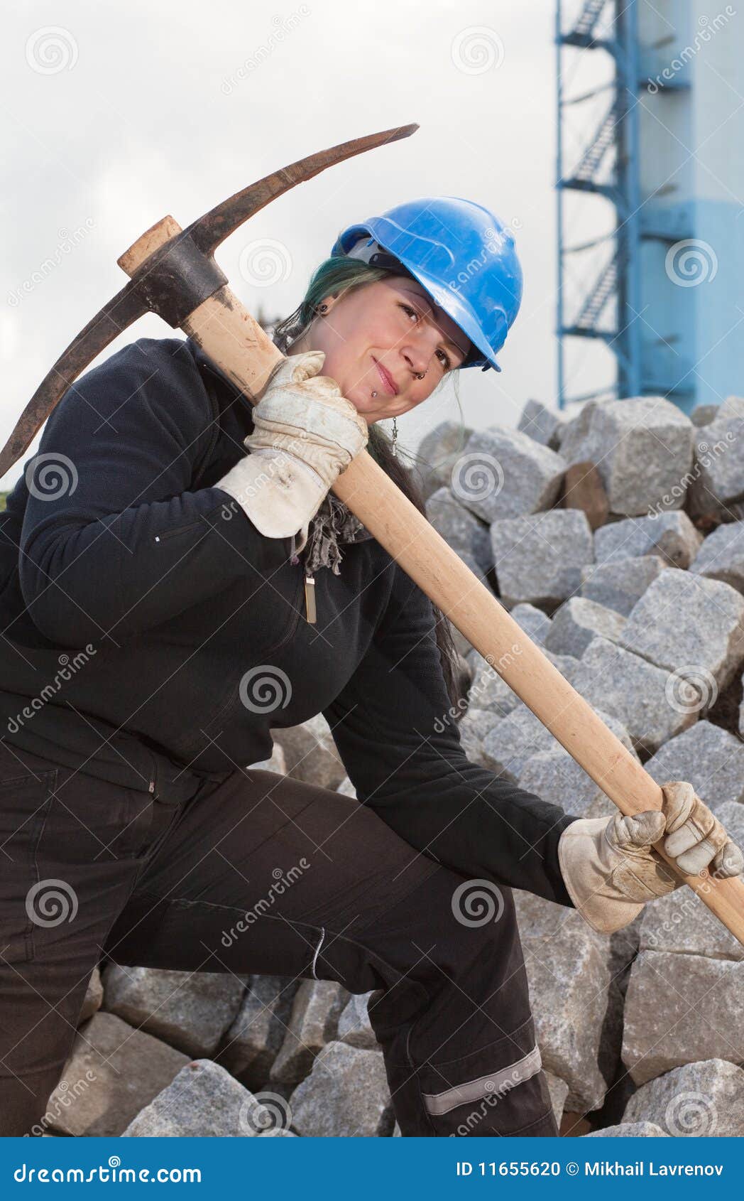Female worker with pickaxe stock photo. Image of protective - 11655620