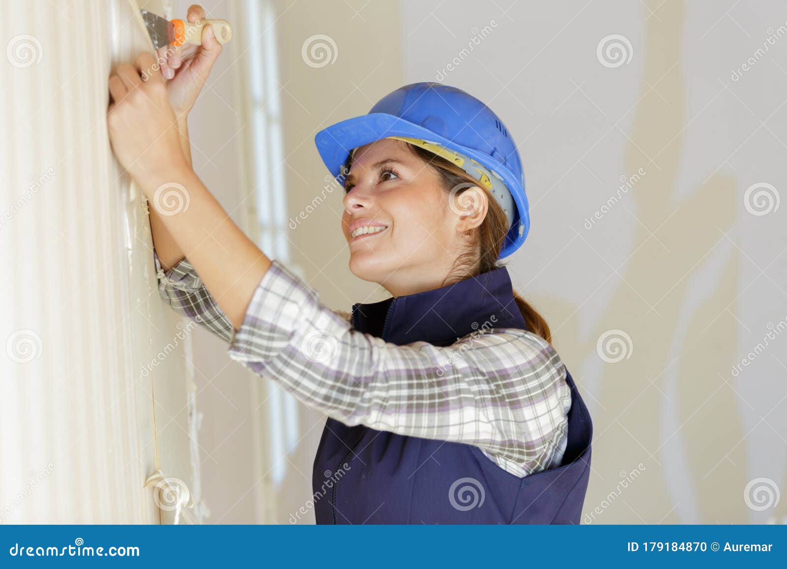 Female Worker Sand Papering Wall Stock Photo - Image of cement ...