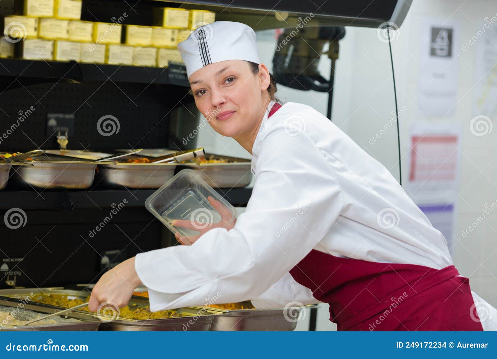Female Worker Serving at Buffet Counter Cooked Food Stock Photo - Image ...