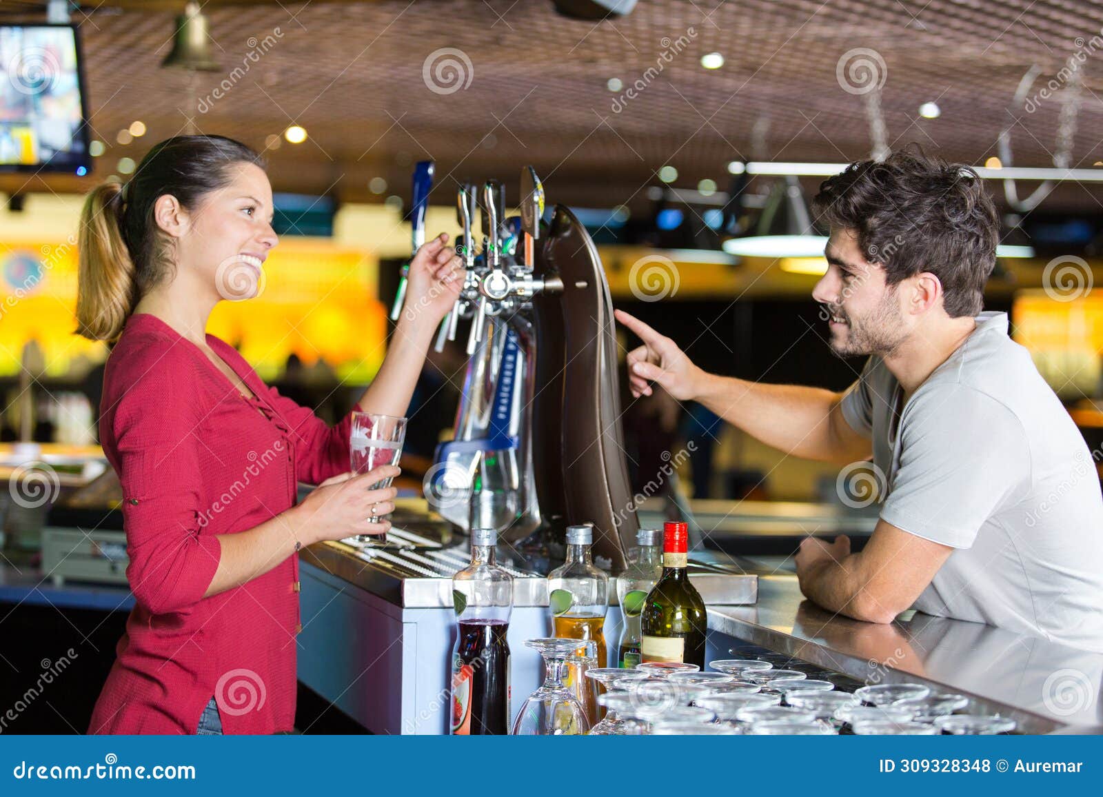 Female Worker Serving Drink To Male Customer Stock Photo - Image of ...