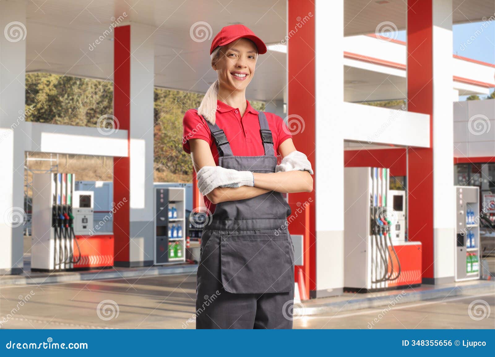 Female Worker Smiling and Posing at a Petrol Station Stock Photo ...