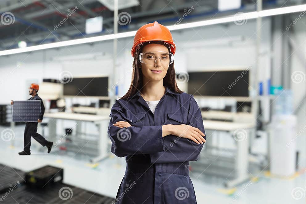 Female Worker in a Uniform Posing in a Solar Panel Factory Stock Photo ...