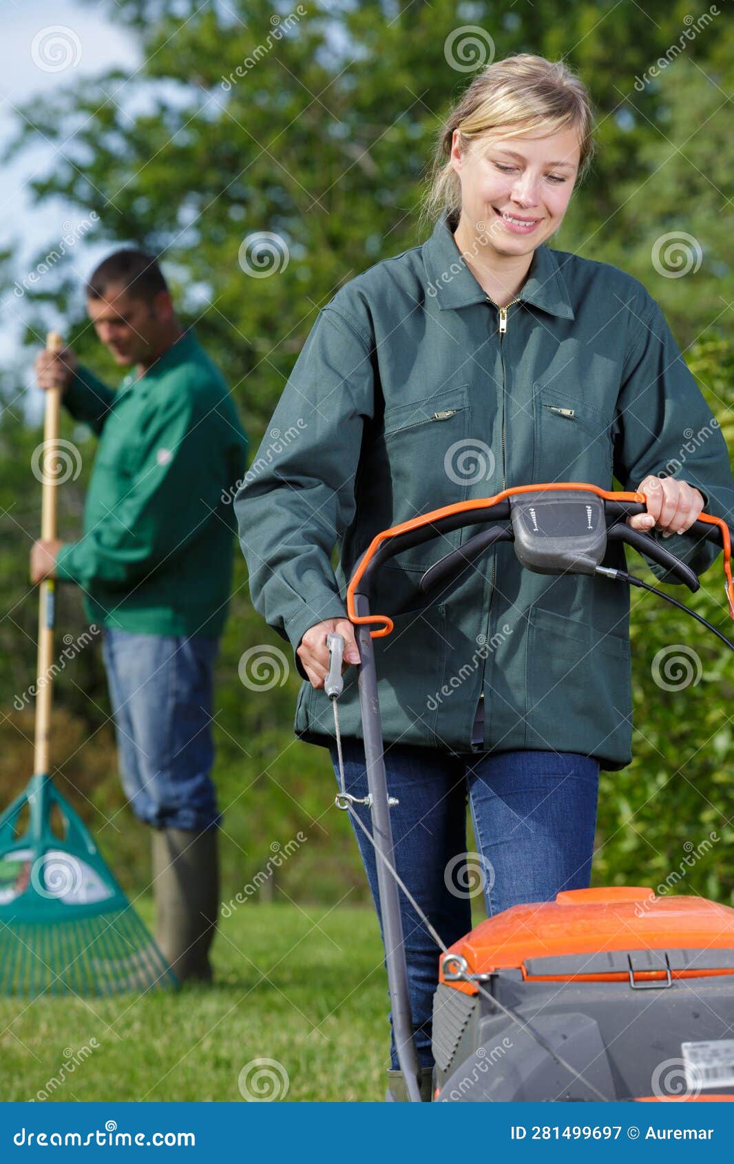 Female Worker Using Lawn Mower for Cutting Green Grass Stock Image ...