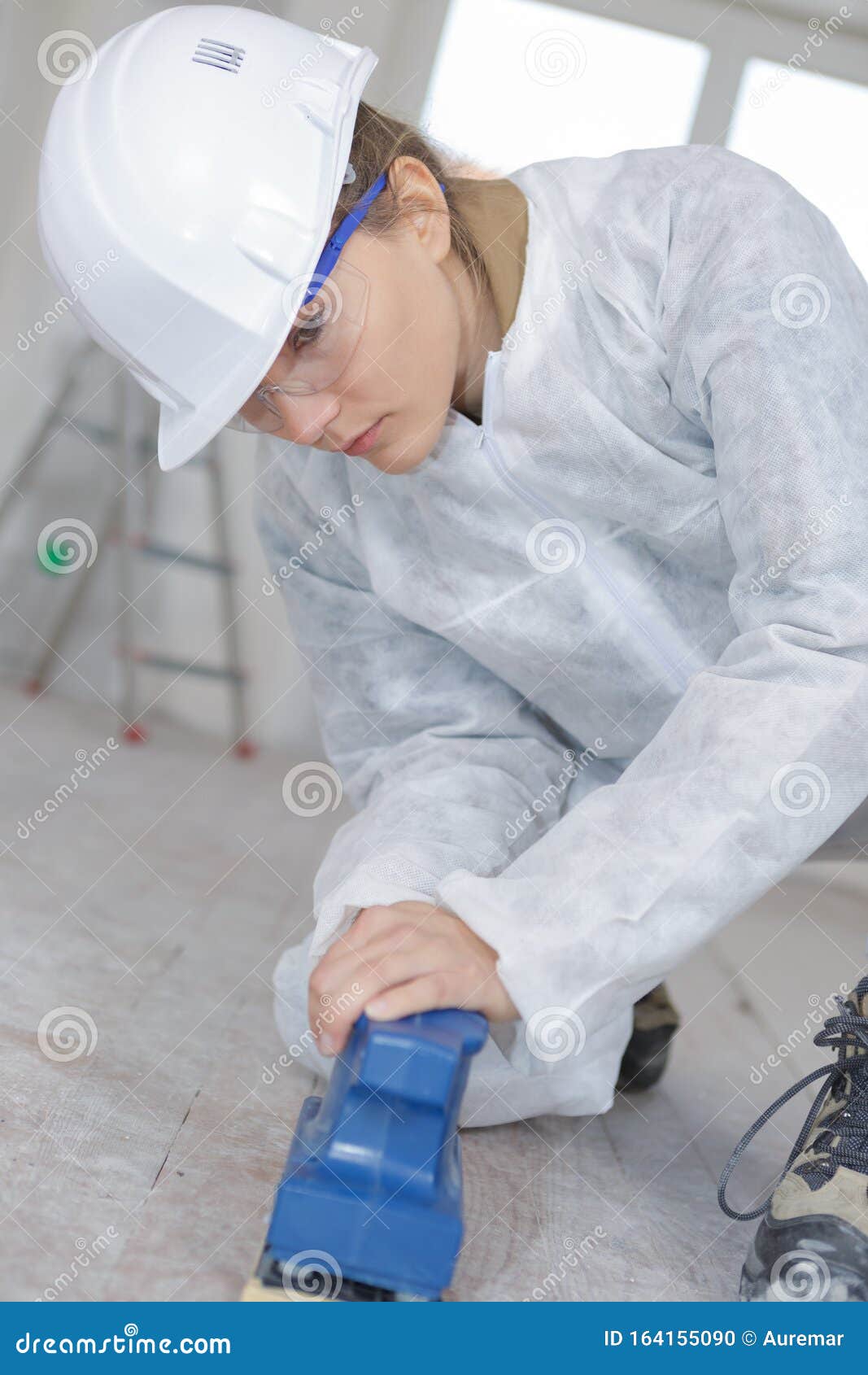 Female Worker Using Sander on Floor Stock Photo - Image of surface ...