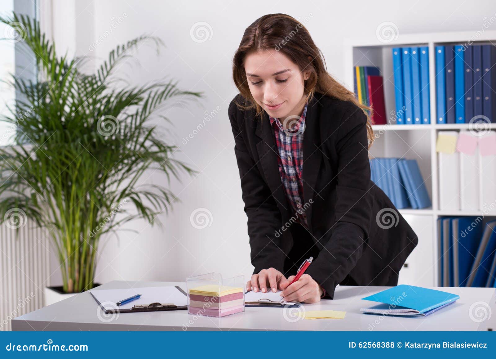 Female Worker Writes Down Ideas Stock Photo - Image of notes, office ...