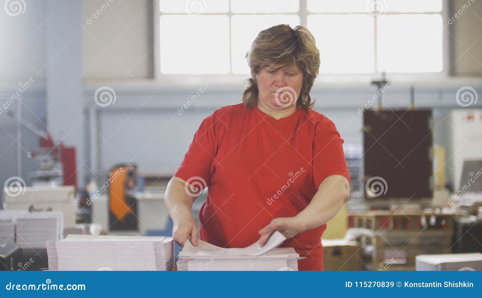 Female Workers Sorting a Paper Stacks in the Typography Stock Image ...