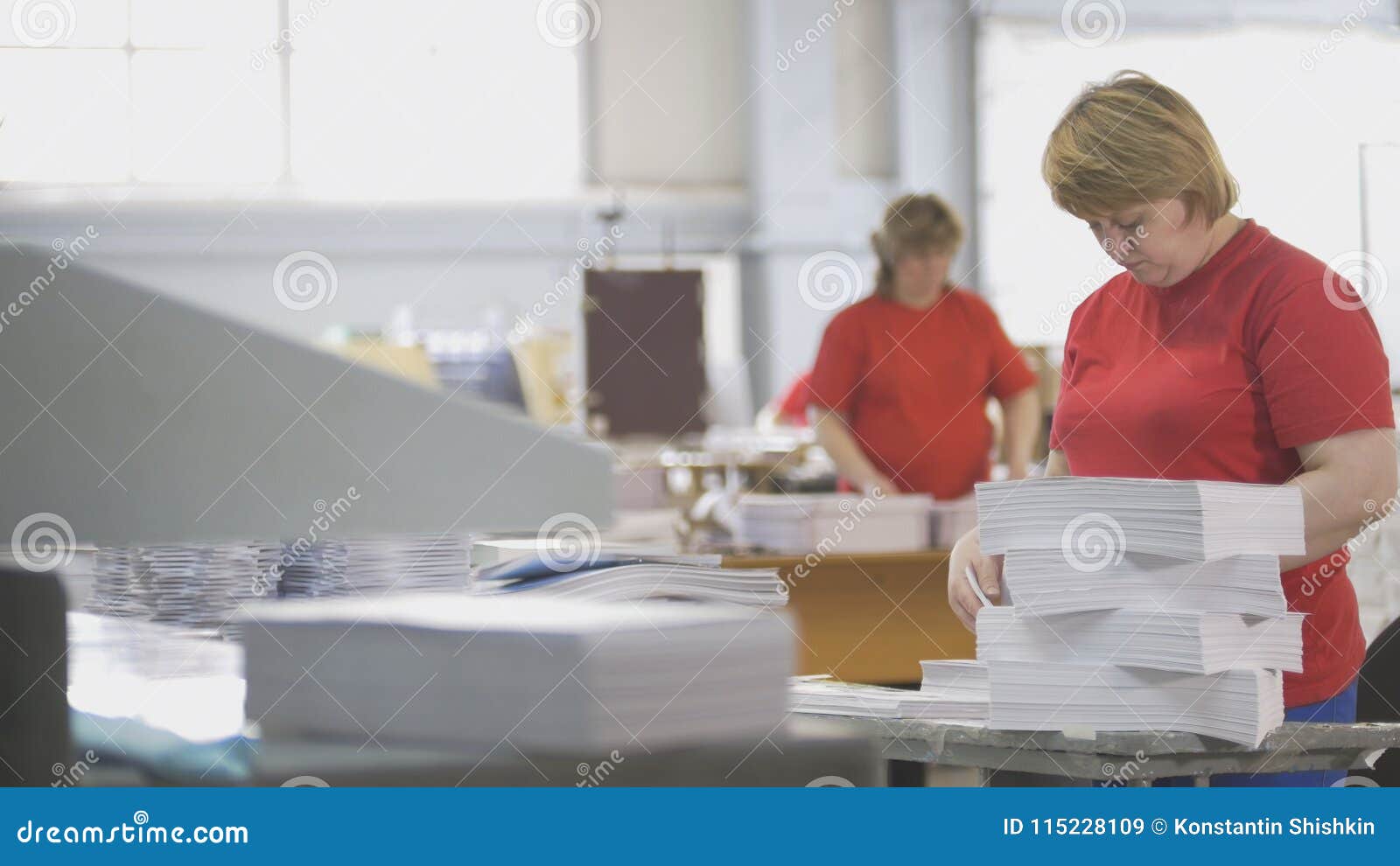 Female Workers Sorting a Paper Stacks in the Typography Stock Image ...