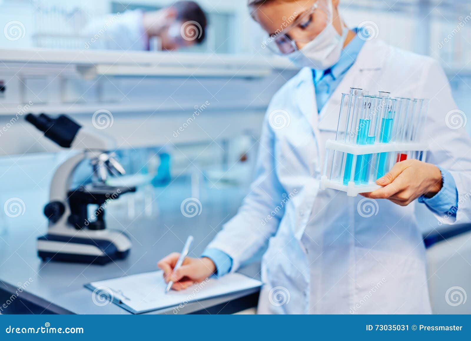 Female working in lab stock image. Image of women, working - 73035031
