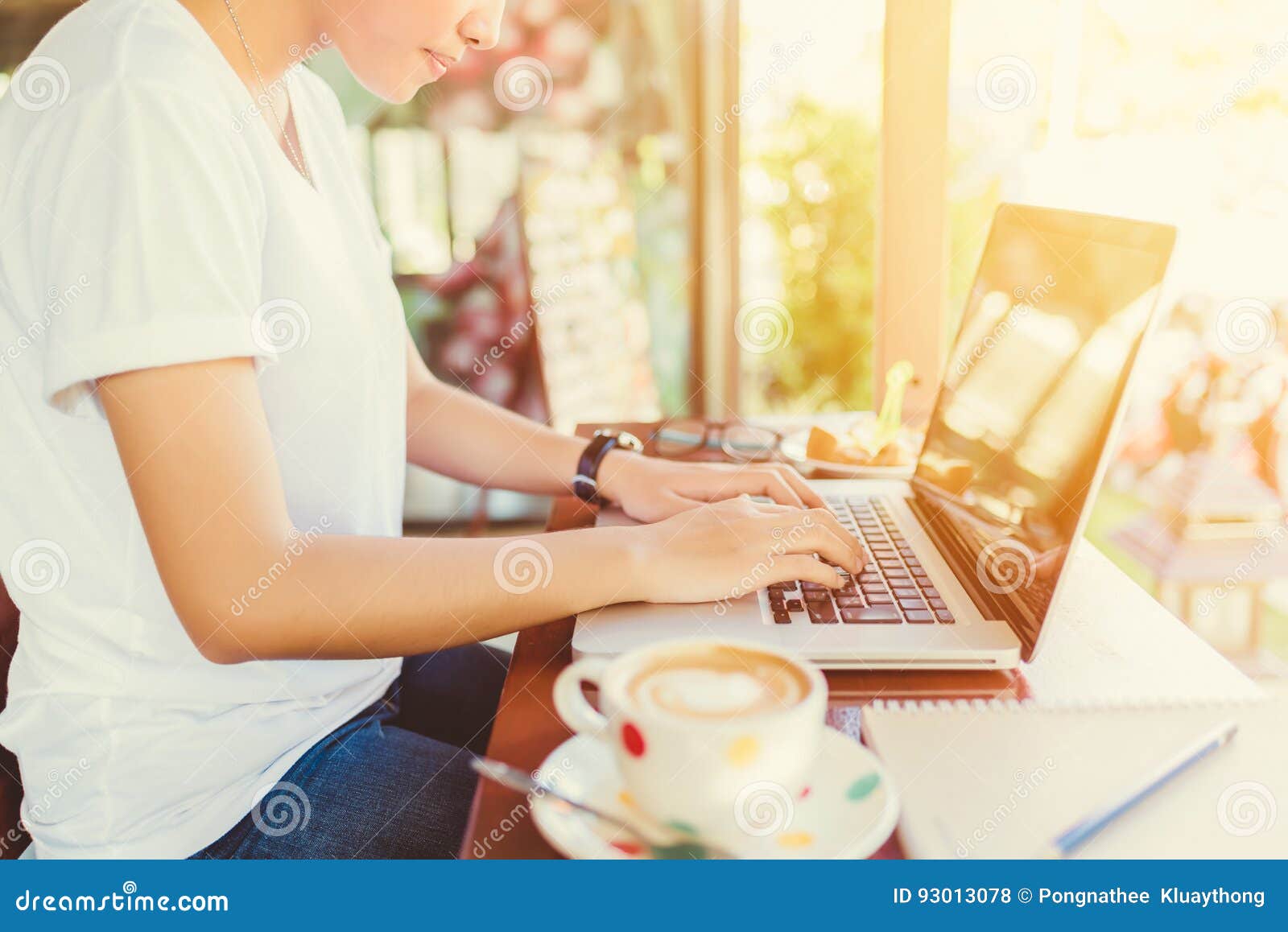 Female Working on Laptop in a Cafe. Stock Photo - Image of computer ...