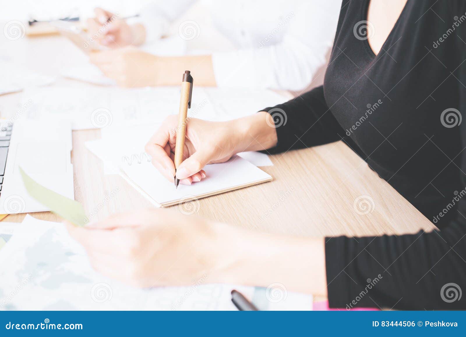 Female writing in notepad stock photo. Image of assignment - 83444506