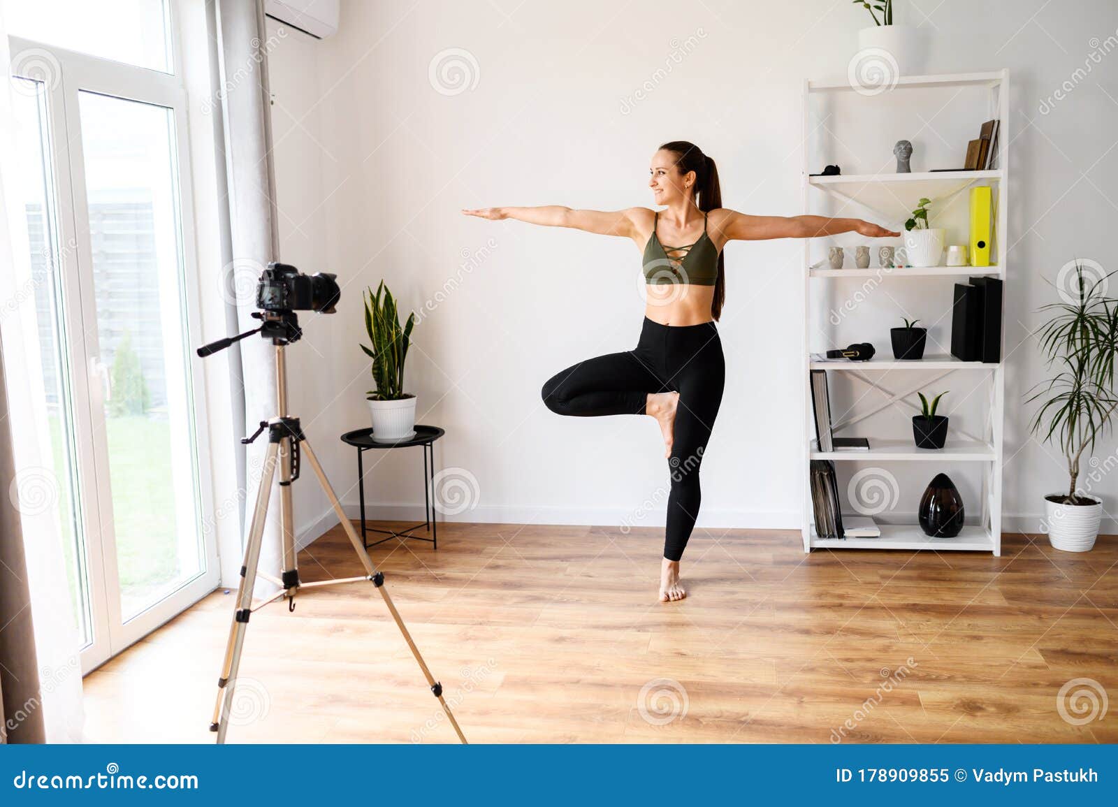 Female Yoga Coach Records Video Tutorial Stock Image - Image of indoor ...