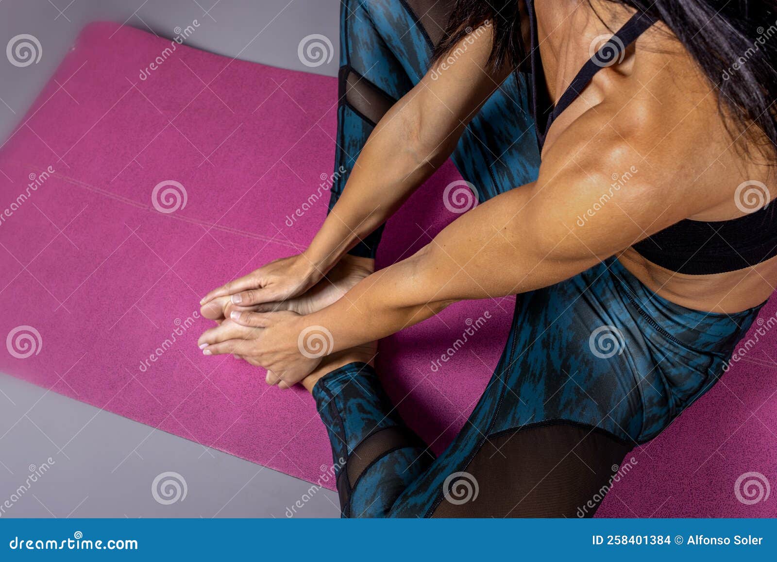 Female Yoga Instructor in Lotus Posture Stock Photo - Image of person ...