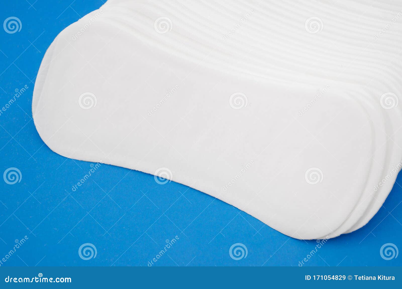 Feminine Sanitary Pads on a Blue Background. Stock Image - Image of ...
