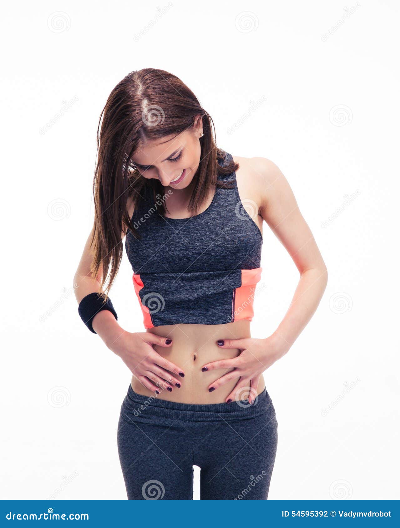 Femme Heureuse De Forme Physique Regardant Son Corps Parfait Photo ...