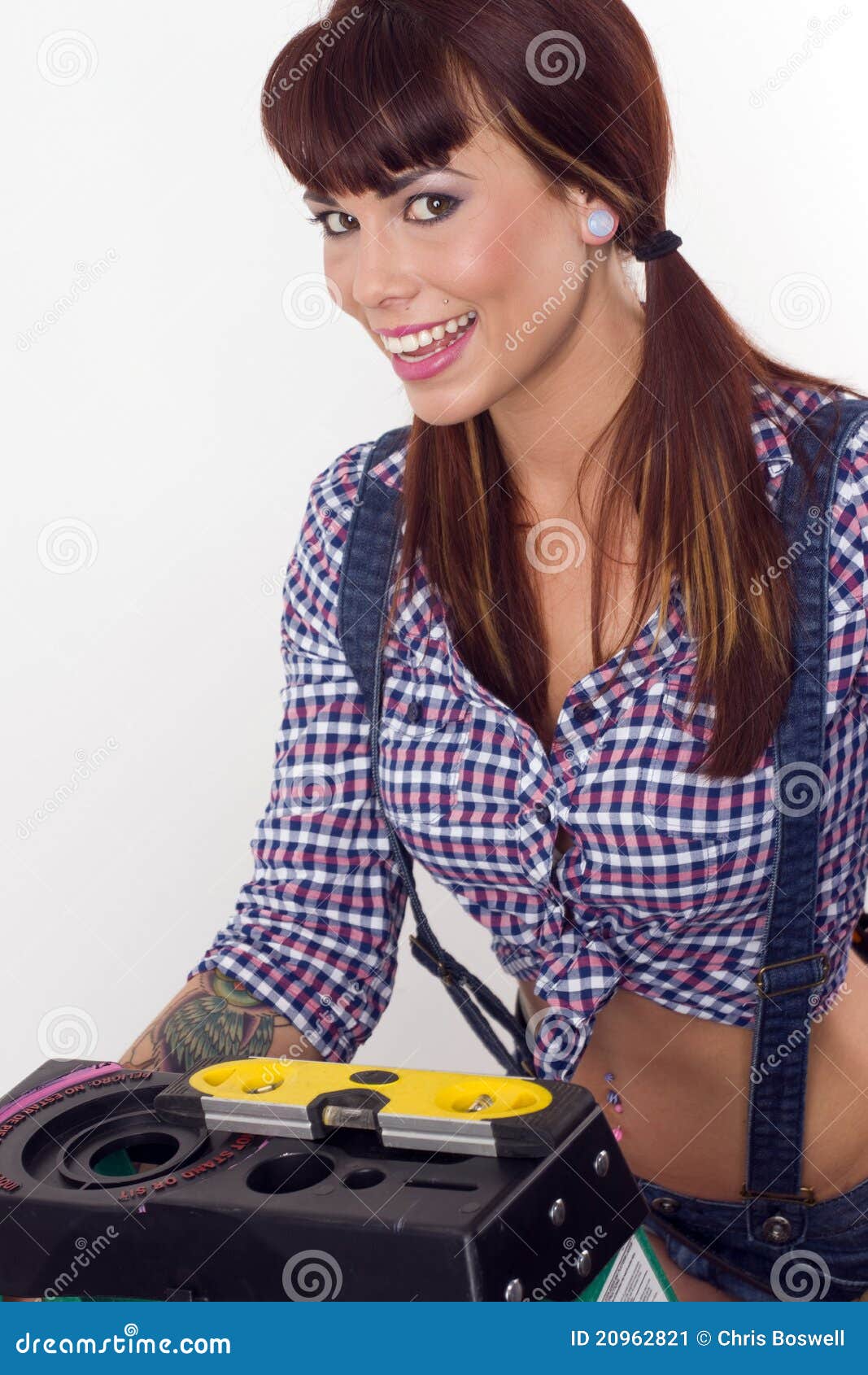 Femme maniable image stock. Image du regarder, échelle - 20962821