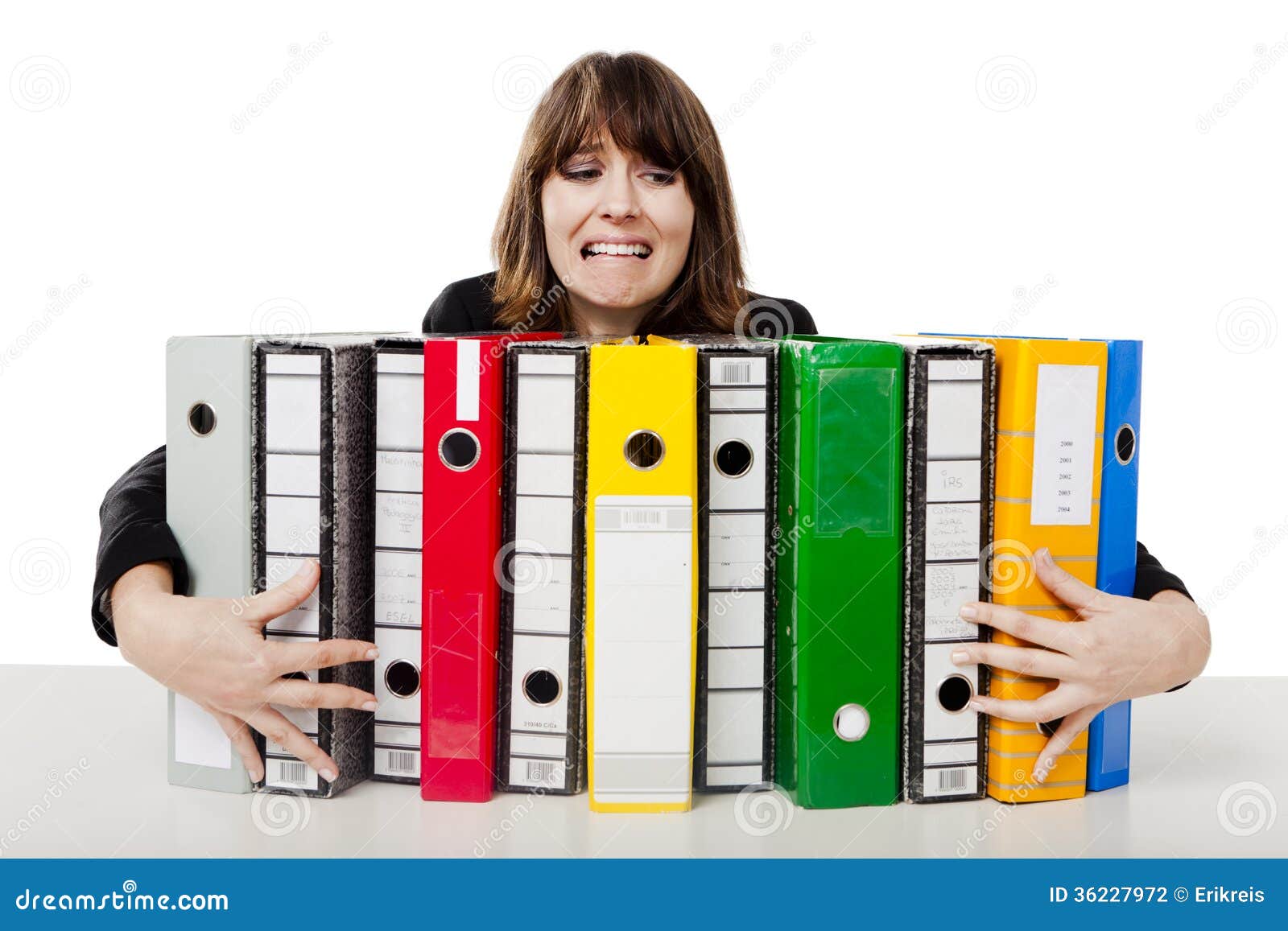 Femme tenant des dossiers photo stock. Image du businesswoman - 36227972