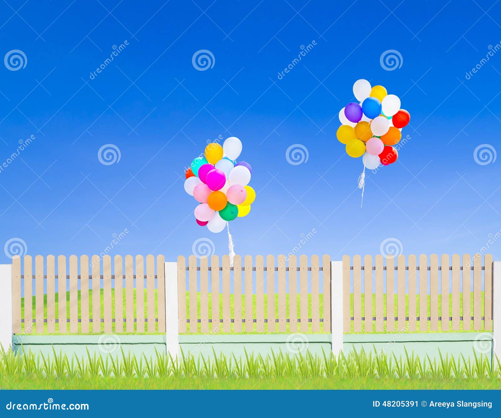 Fence balloons on blue sky stock image. Image of barrier - 48205391