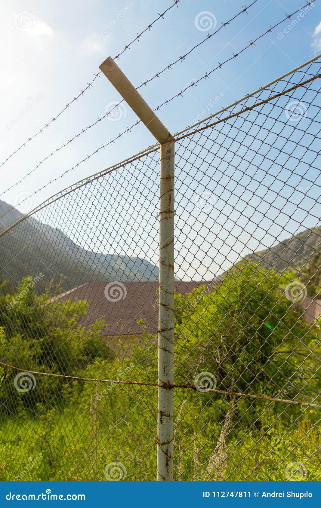 Fence with Barbed Wire in the Open Air Stock Image - Image of border ...