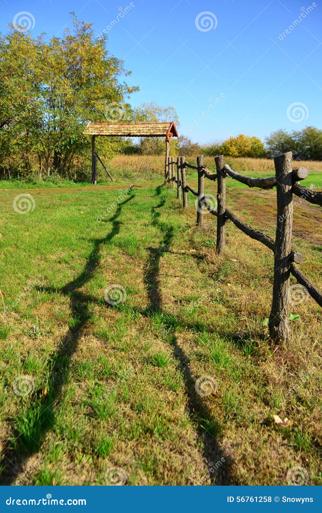 Fence on a field stock photo. Image of field, fence, rail - 56761258