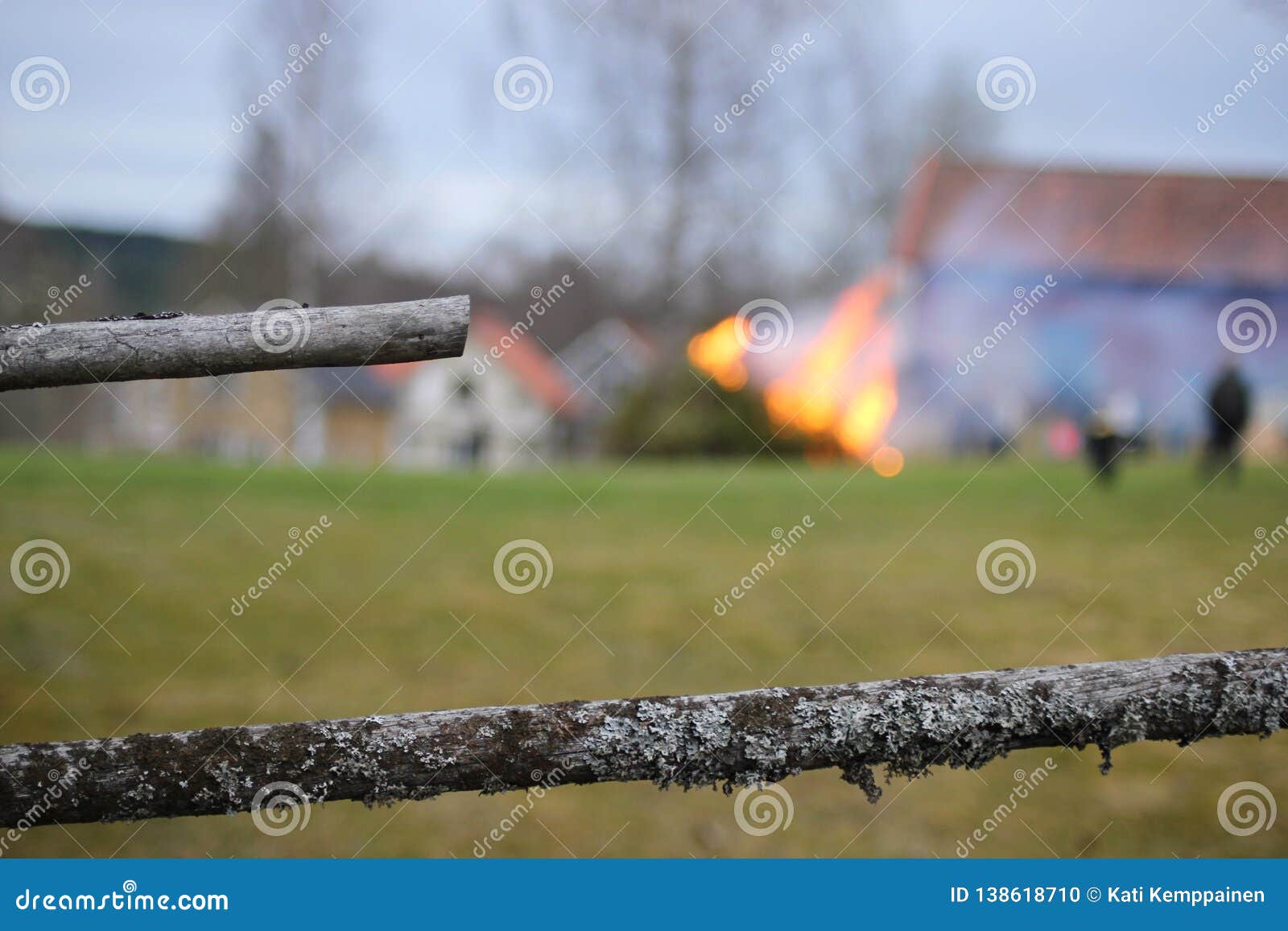 A Fence with a Fire in the Background Stock Photo - Image of burning ...
