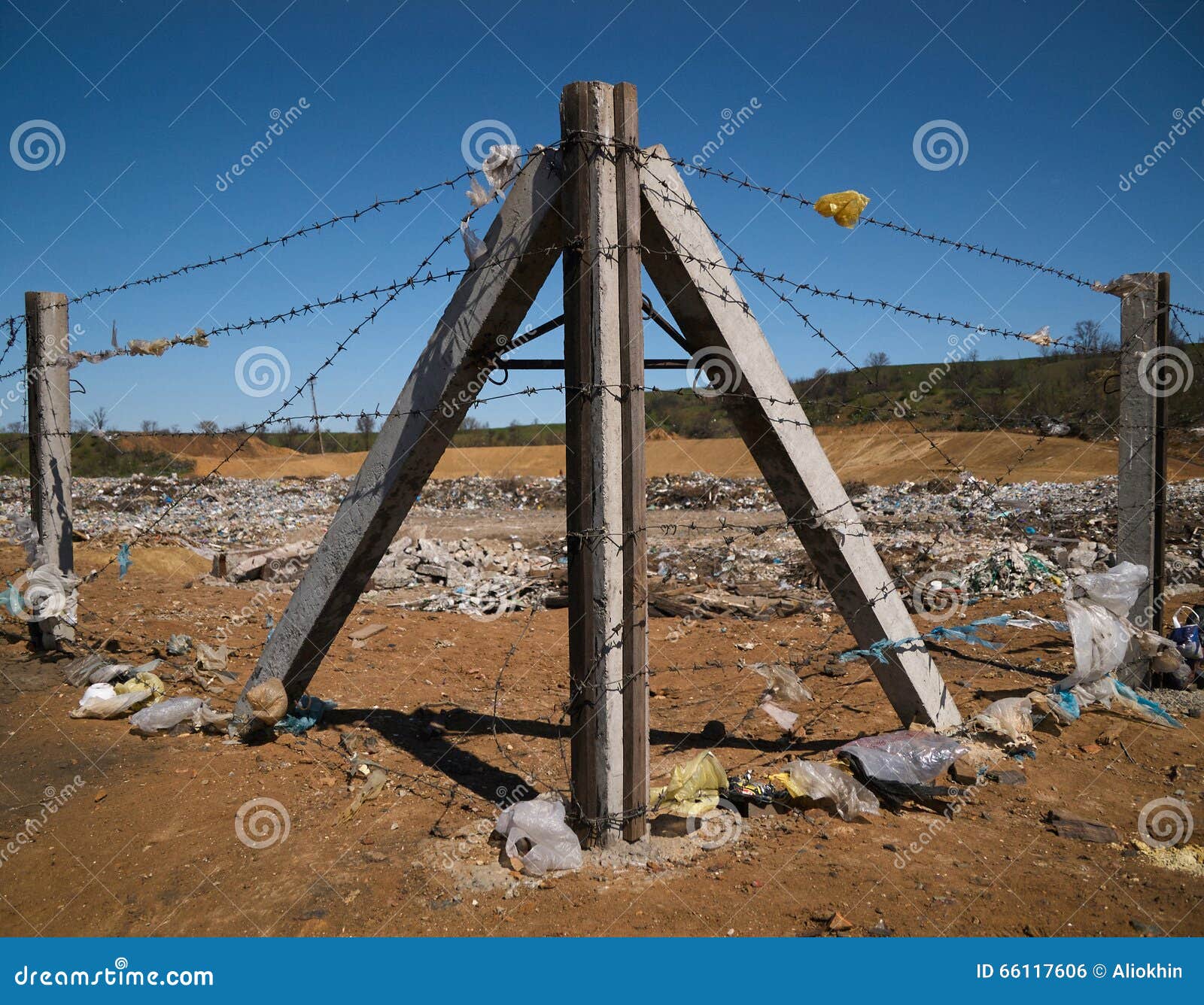 Fence of the garbage dump stock photo. Image of abandoned - 66117606