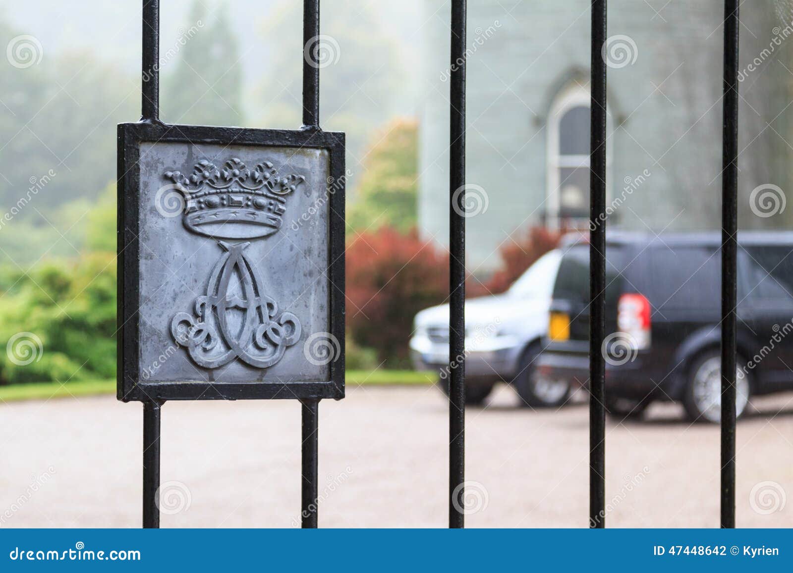 Fence of a Gate To a Luxury Residence with Crest Stock Photo - Image of ...
