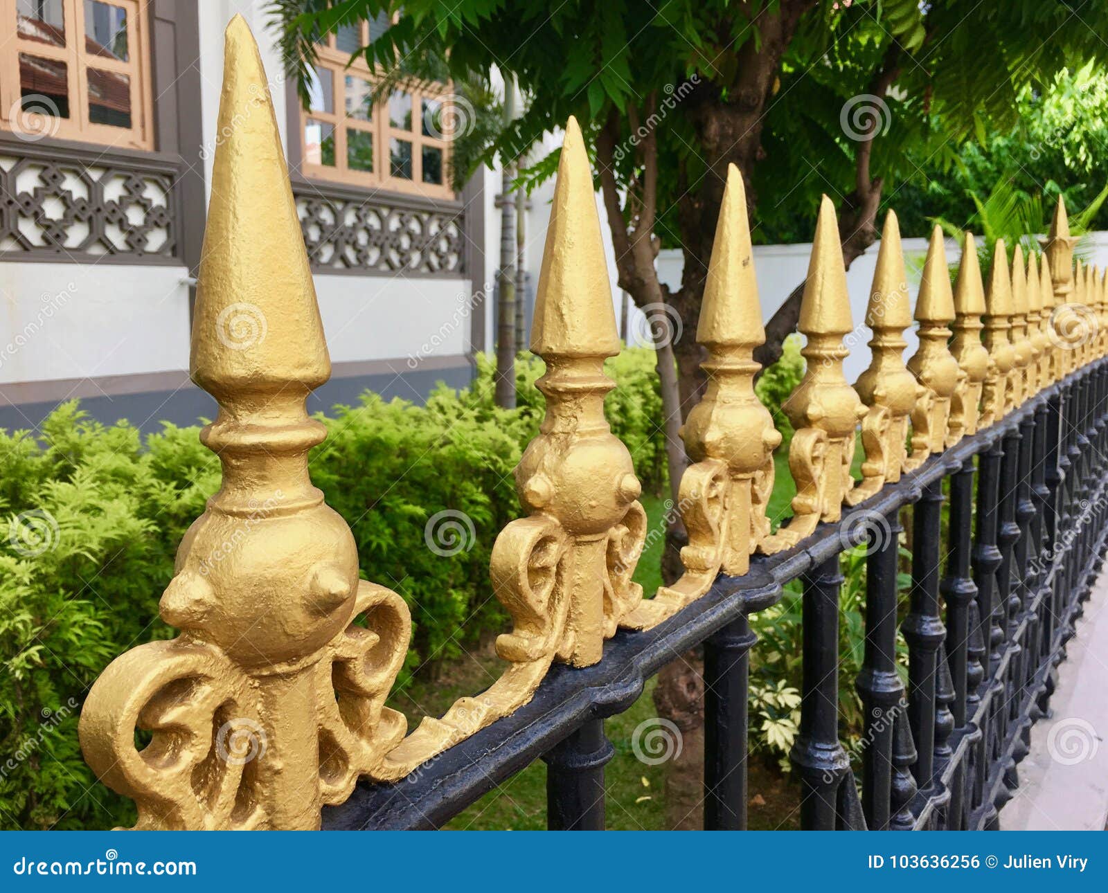 Fence with golden spikes stock photo. Image of fence - 103636256