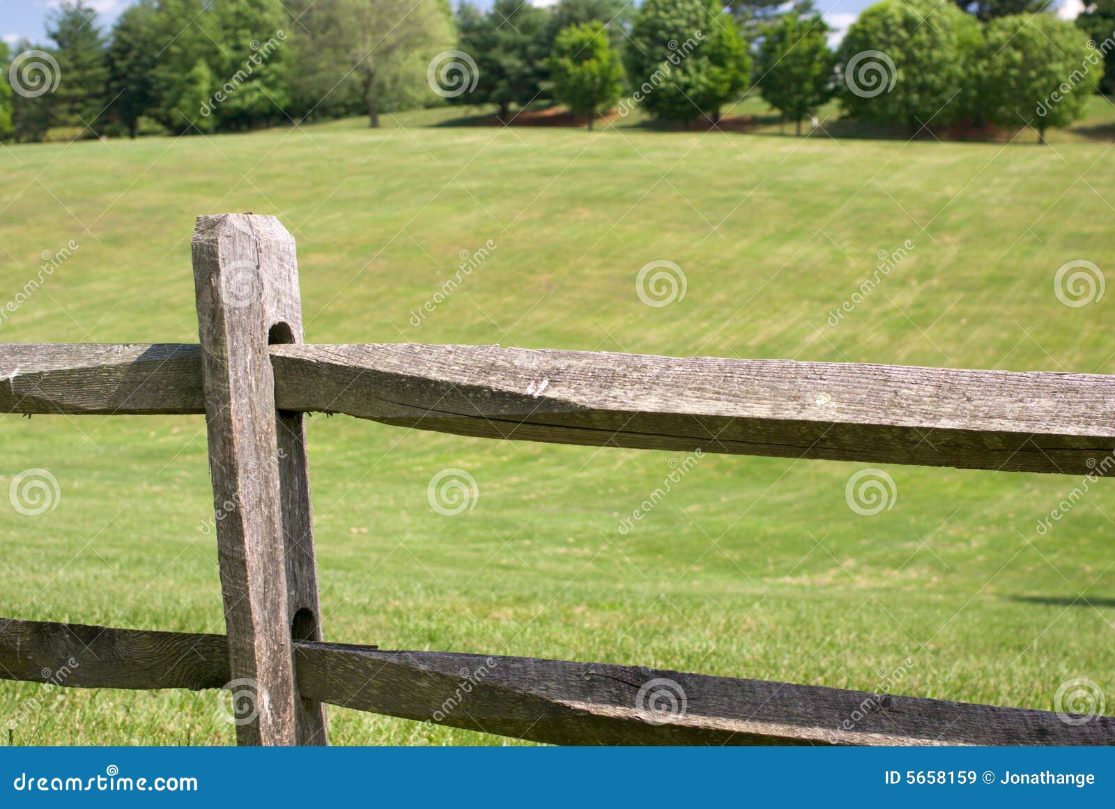 Fence and green field stock image. Image of background - 5658159
