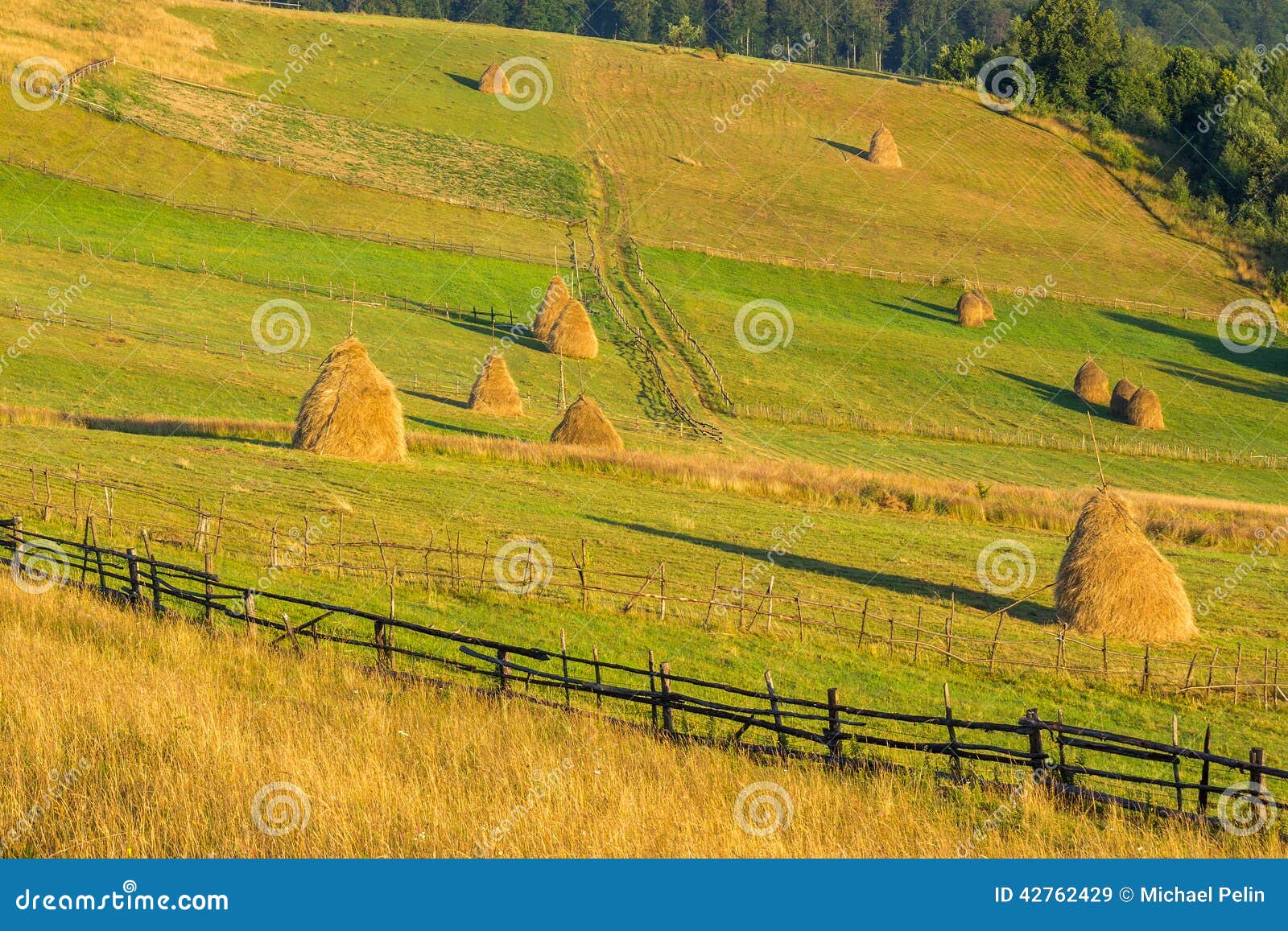 Fence and Haystack in Mountain Stock Image - Image of stack, fence ...
