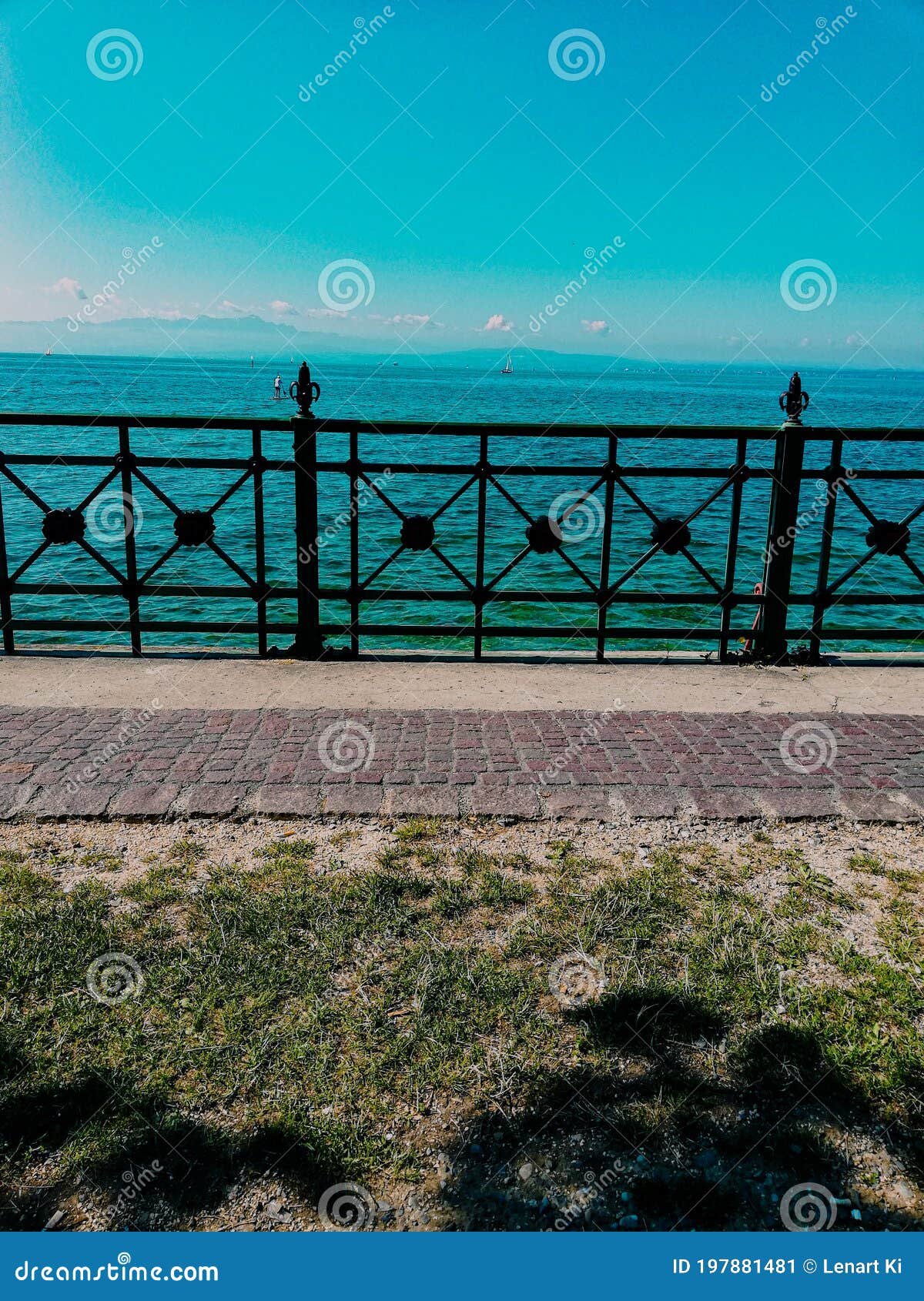 A fence by the lake stock image. Image of coast, wave - 197881481