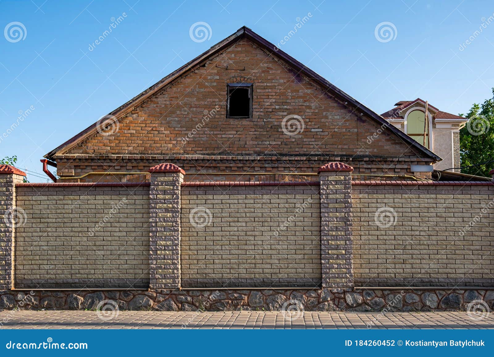 A Fence Made of Decorative White Brick with Pillars Stock Photo - Image ...