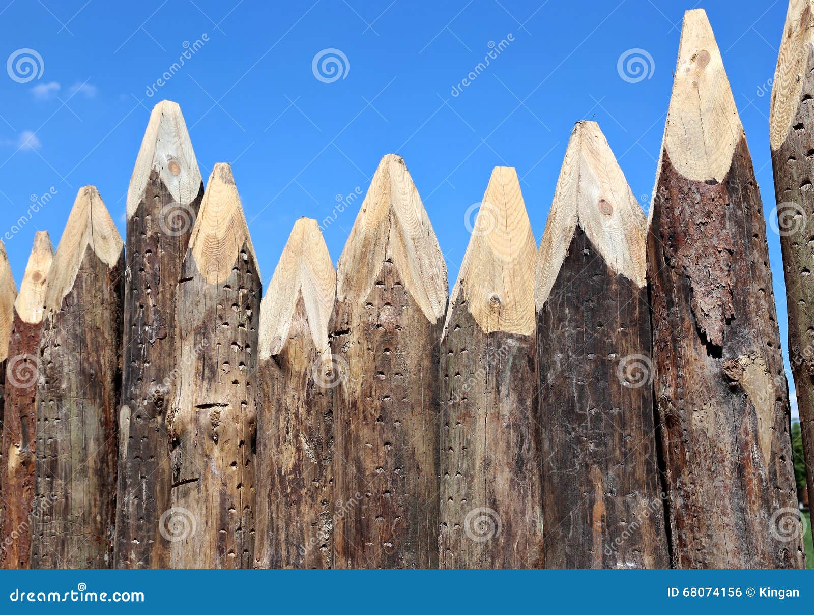 Fence Made of Sharpened Logs Stock Photo - Image of fortress ...